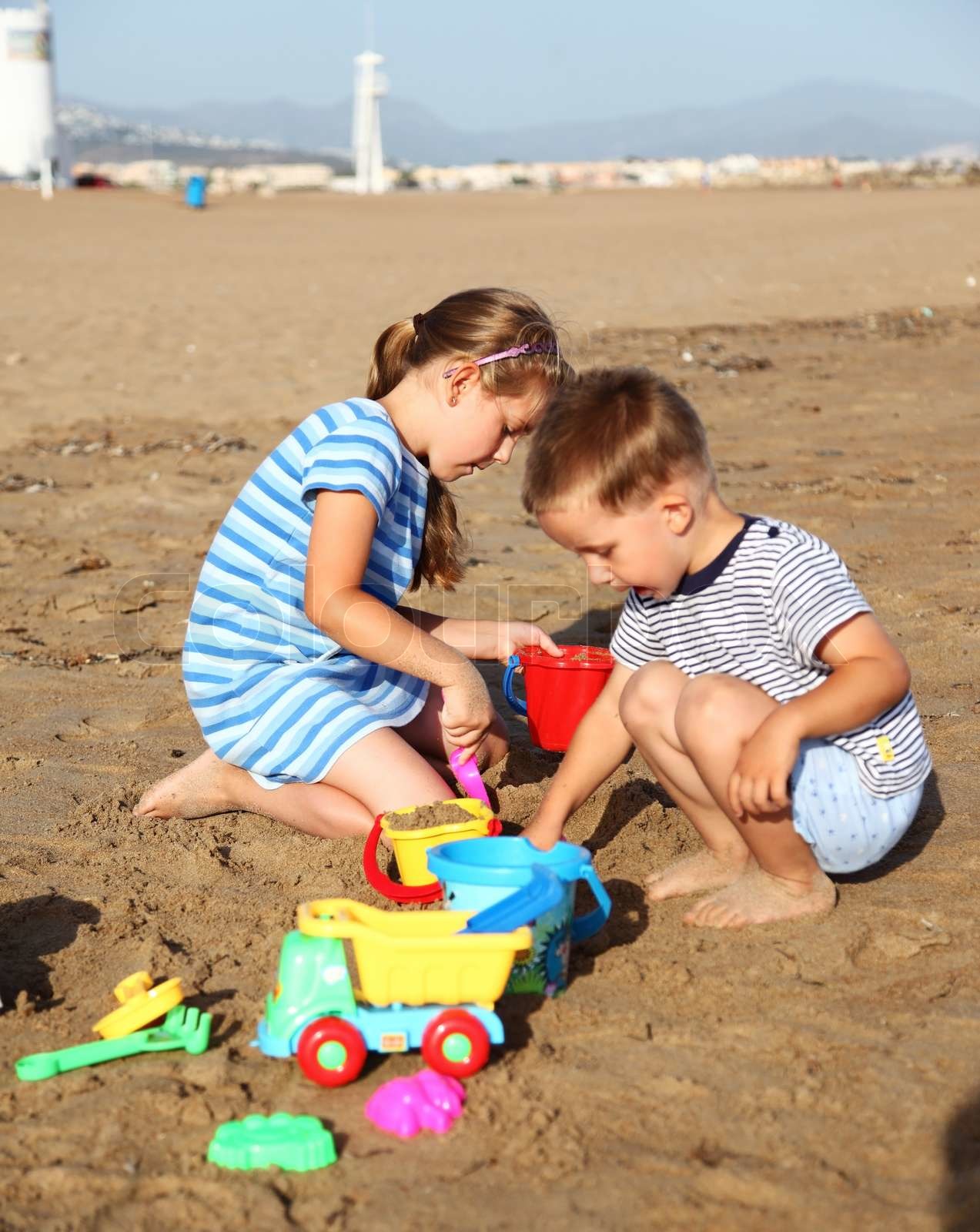 Kids playing on the beach | Stock image | Colourbox