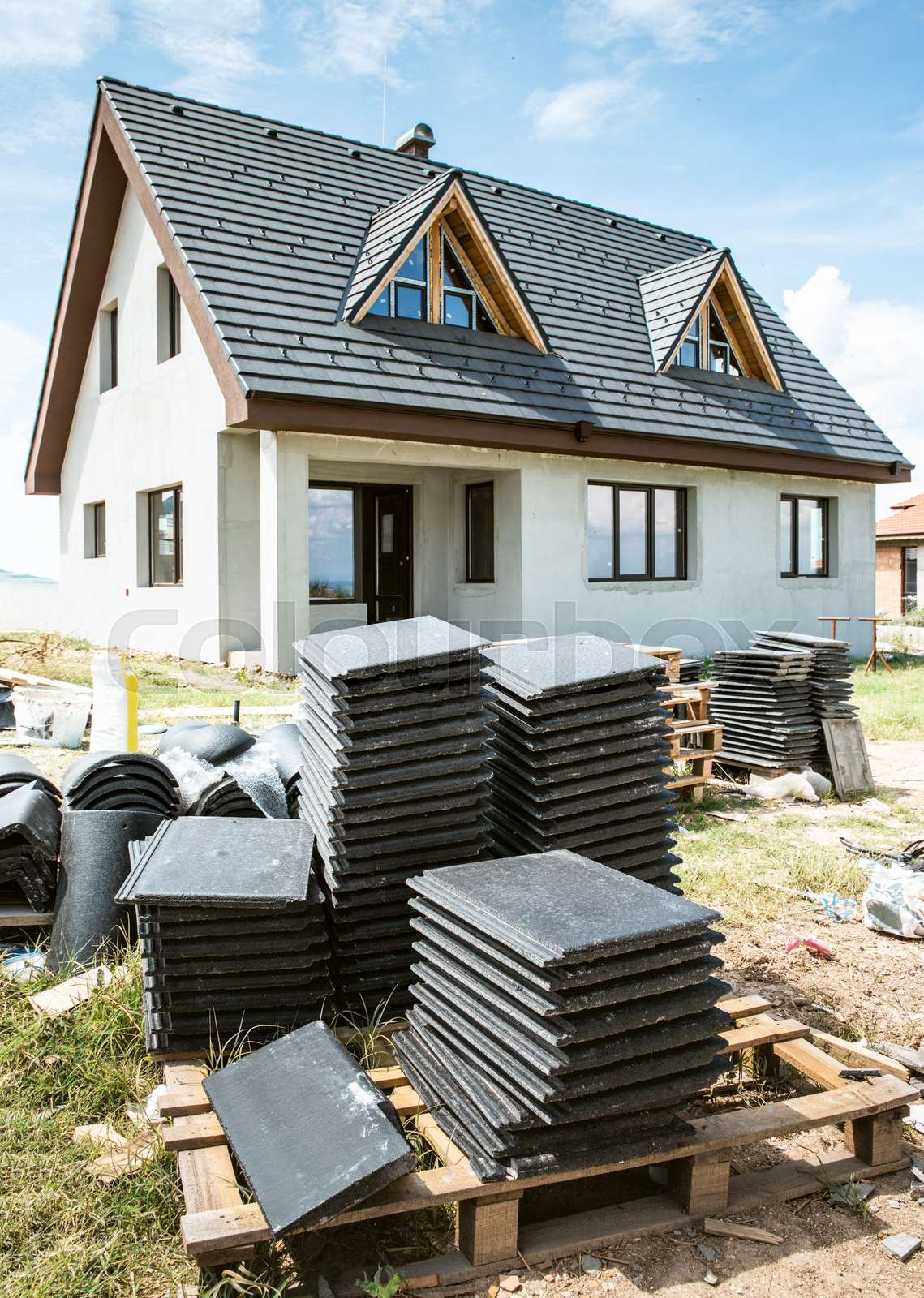 Laying roof tiles | Stock image | Colourbox