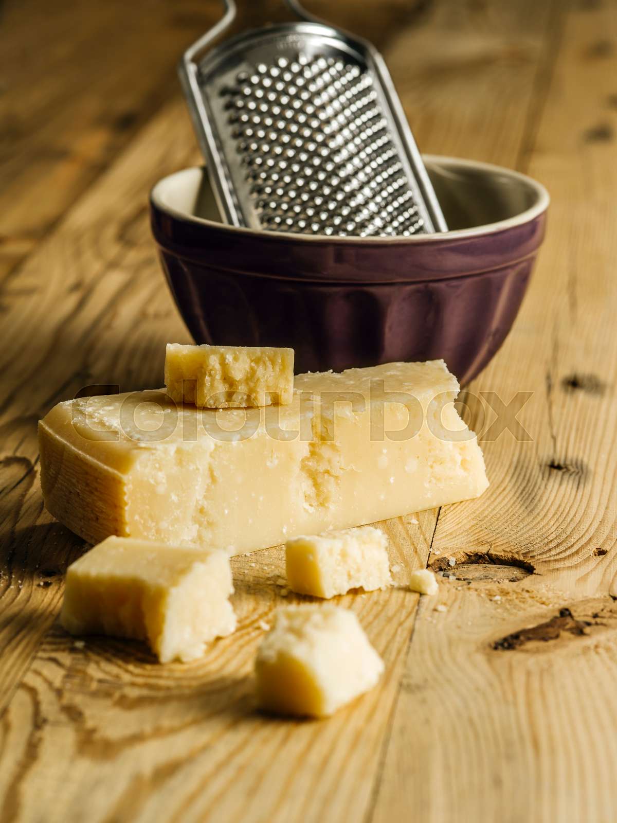 Block of parmesan cheese | Stock image | Colourbox