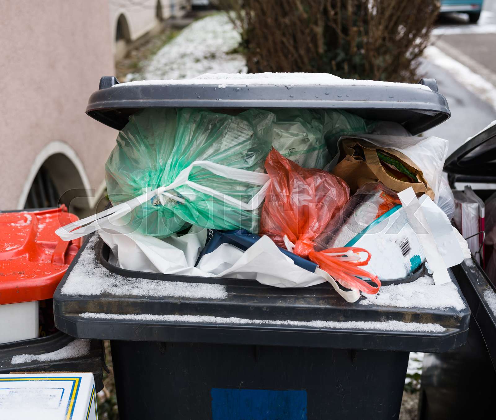 full garbage bin | Stock image | Colourbox