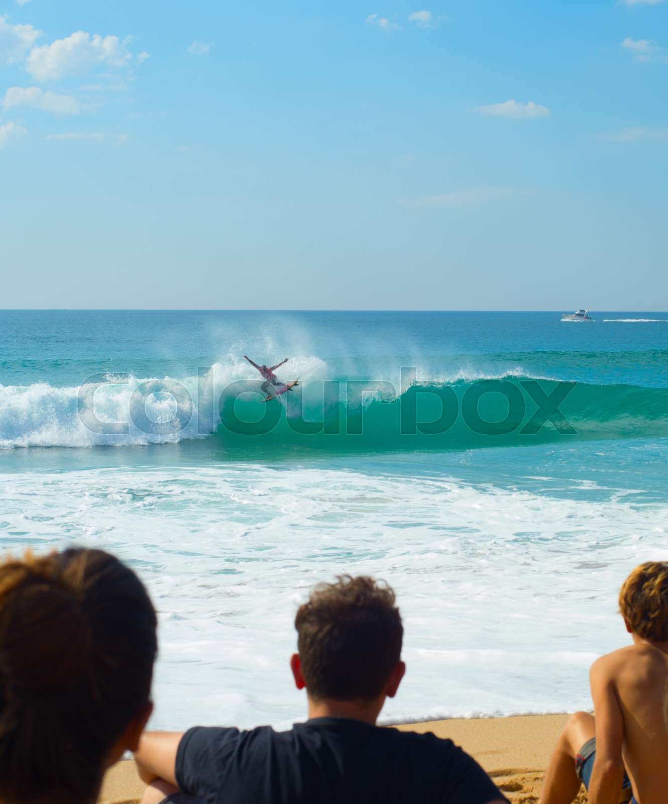 People watching surfing contest beach | Stock image | Colourbox