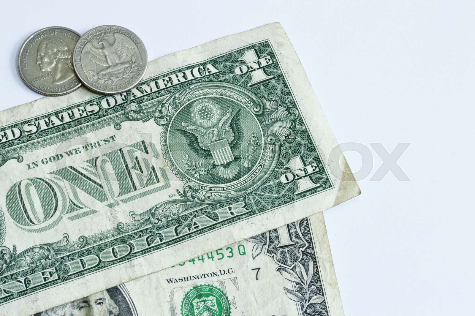 one dollar bills and quarter coins | Stock image | Colourbox