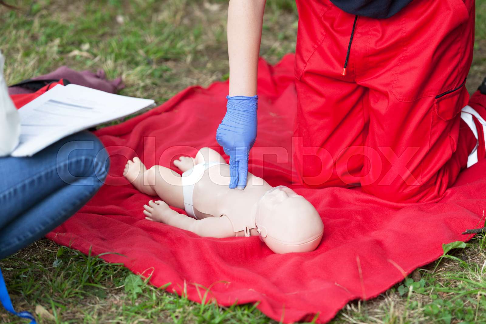 Baby CPR dummy first aid training, two fingers chest compression ...