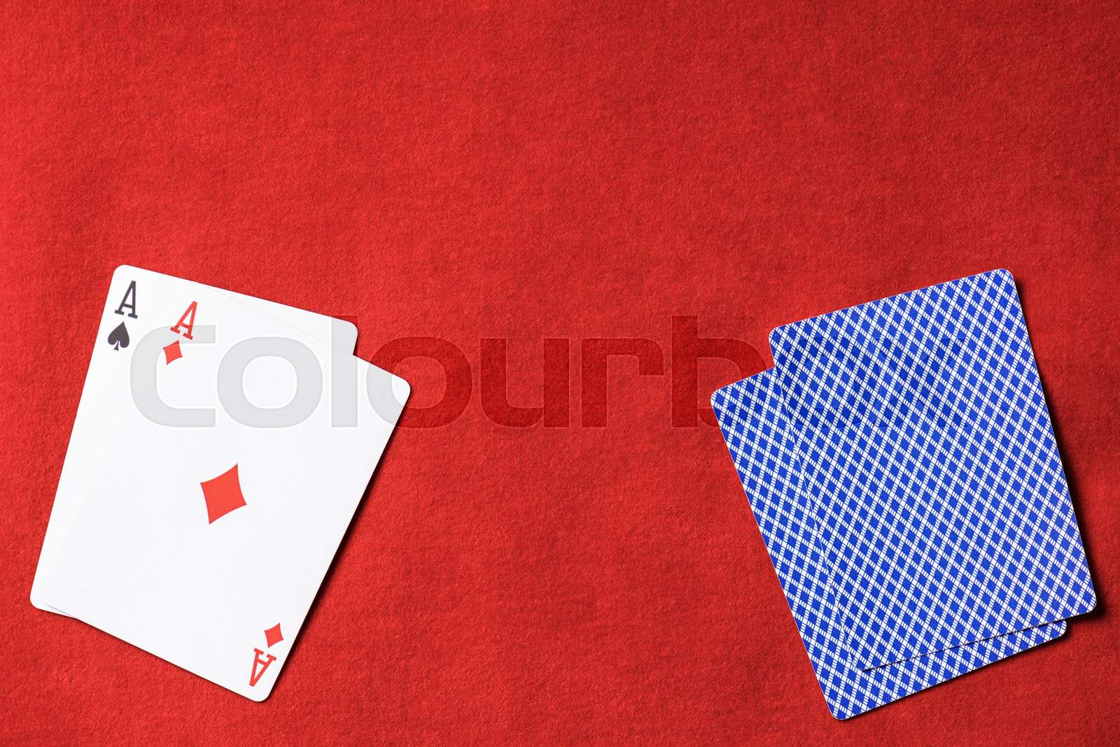top view of red poker table and playing card with diamond suit on deck ...