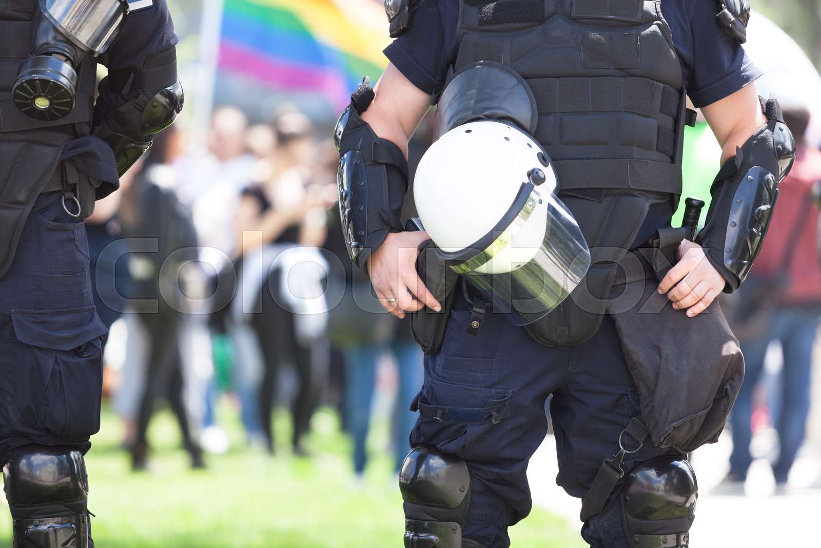 Police officer on duty during LGBT pride parade | Stock image | Colourbox