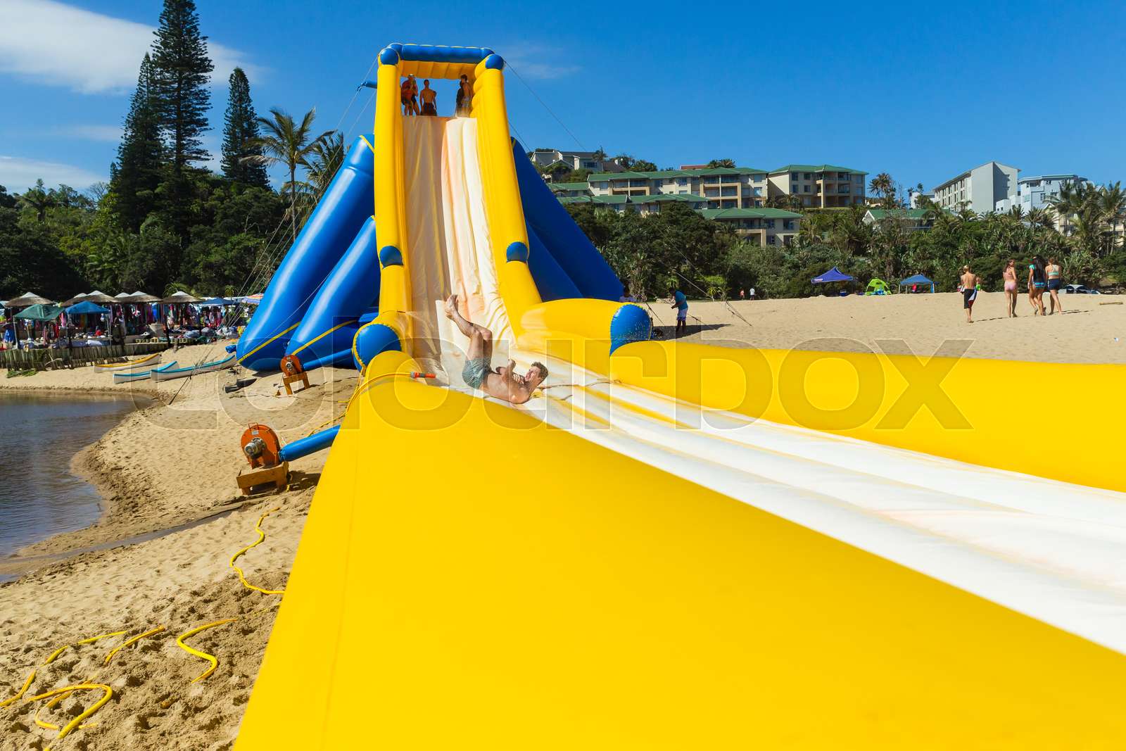 Man Thrill Ride High Water Slide Beach | Stock image | Colourbox