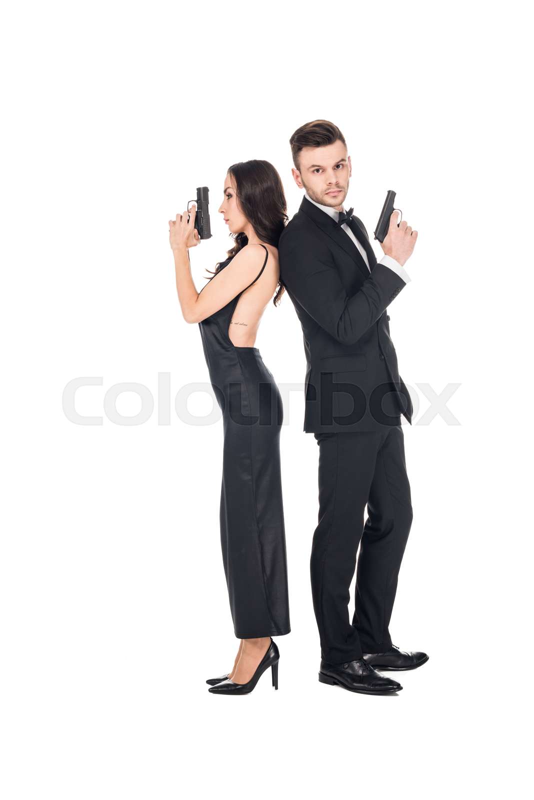 couple of secret agents posing with guns, isolated on white | Stock ...