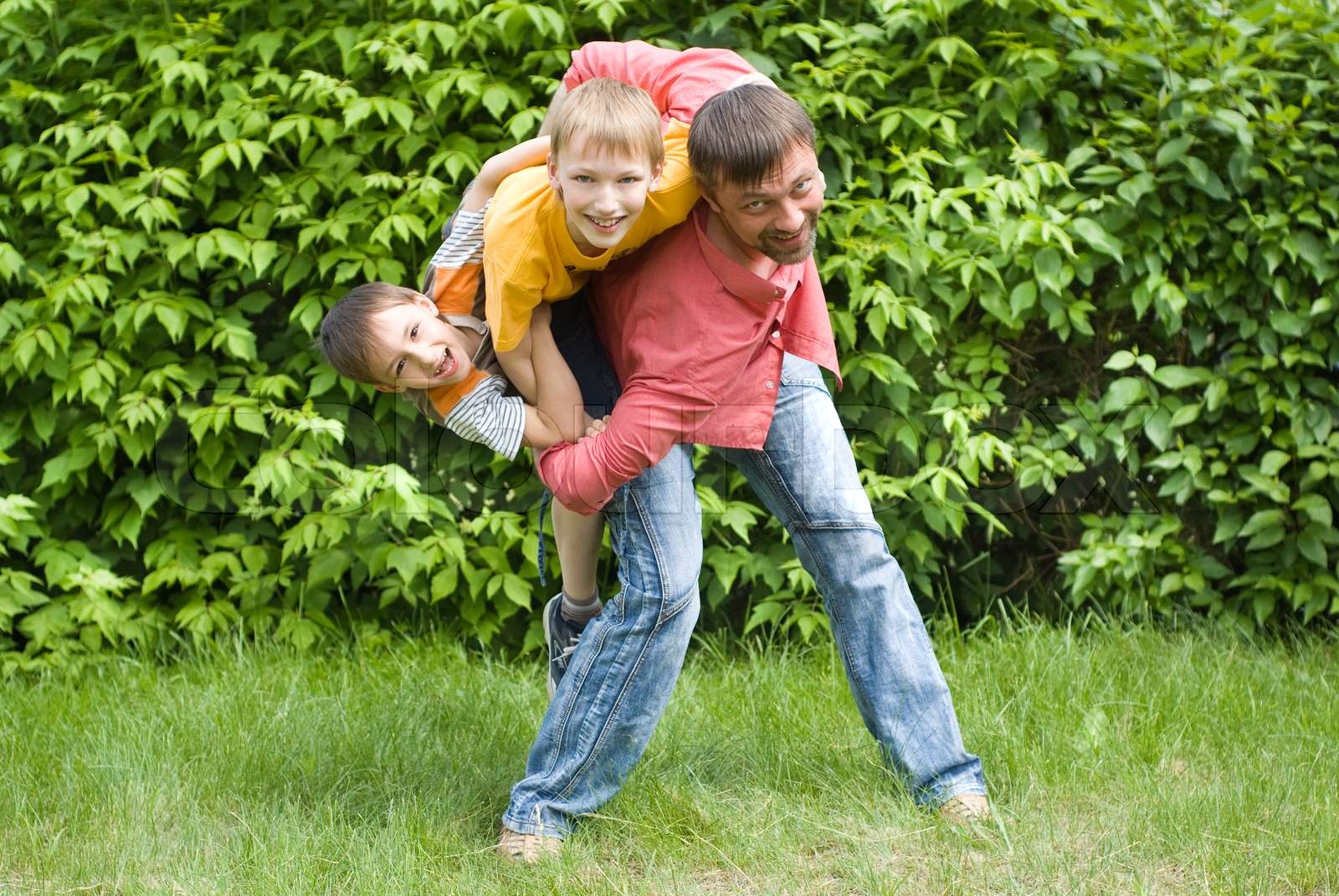 father playing with children | Stock image | Colourbox