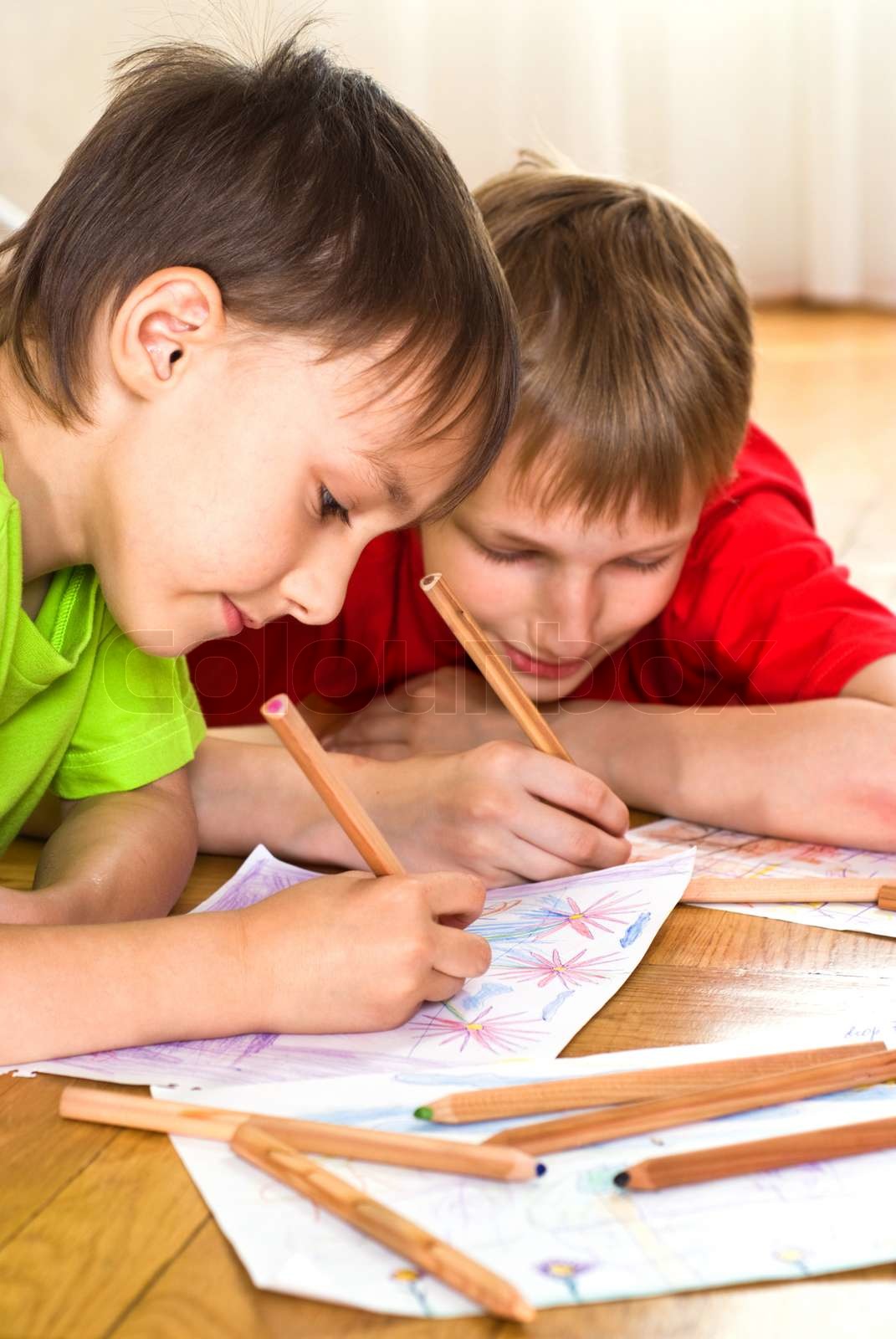 two brothers draw | Stock image | Colourbox