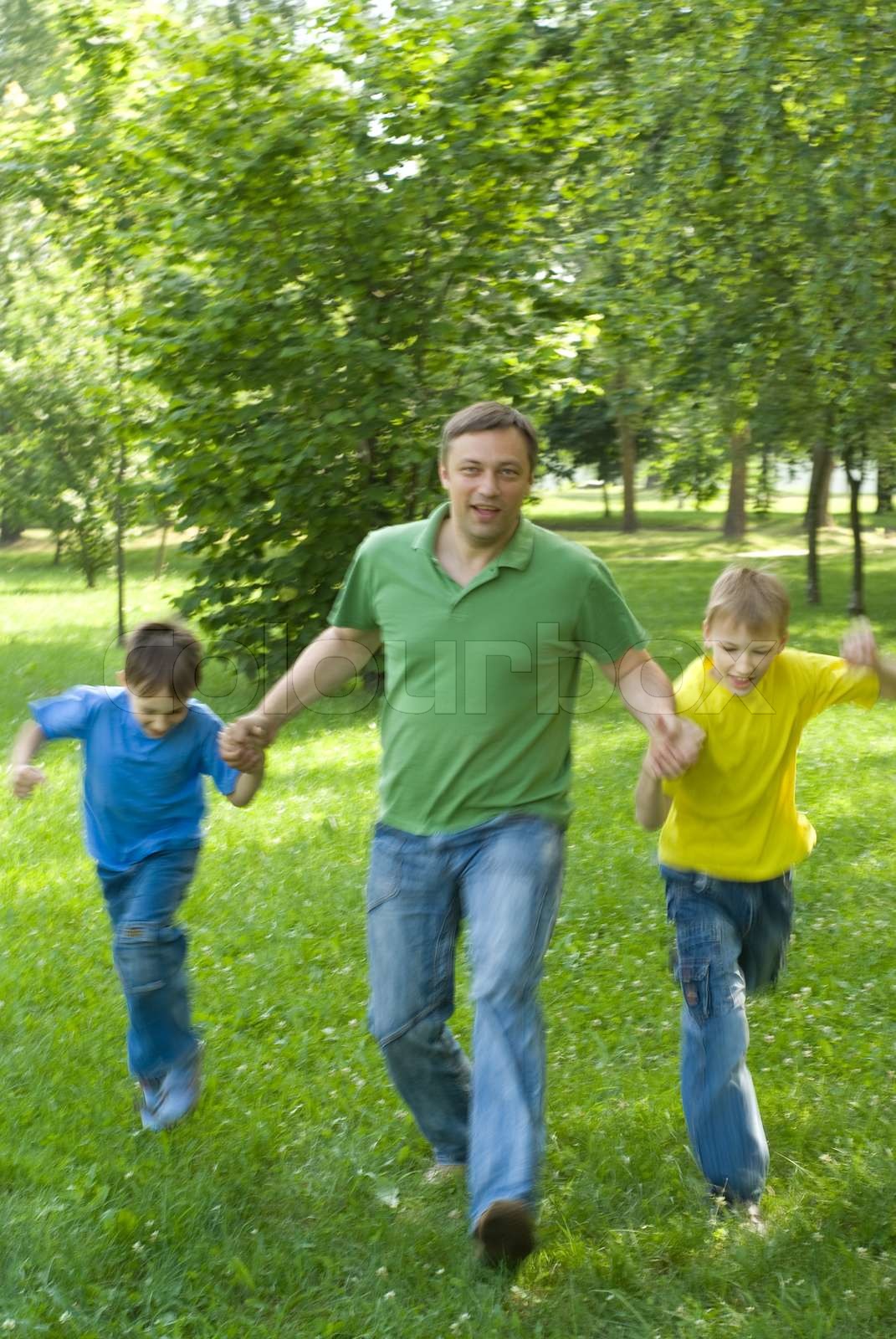 father playing with children | Stock image | Colourbox