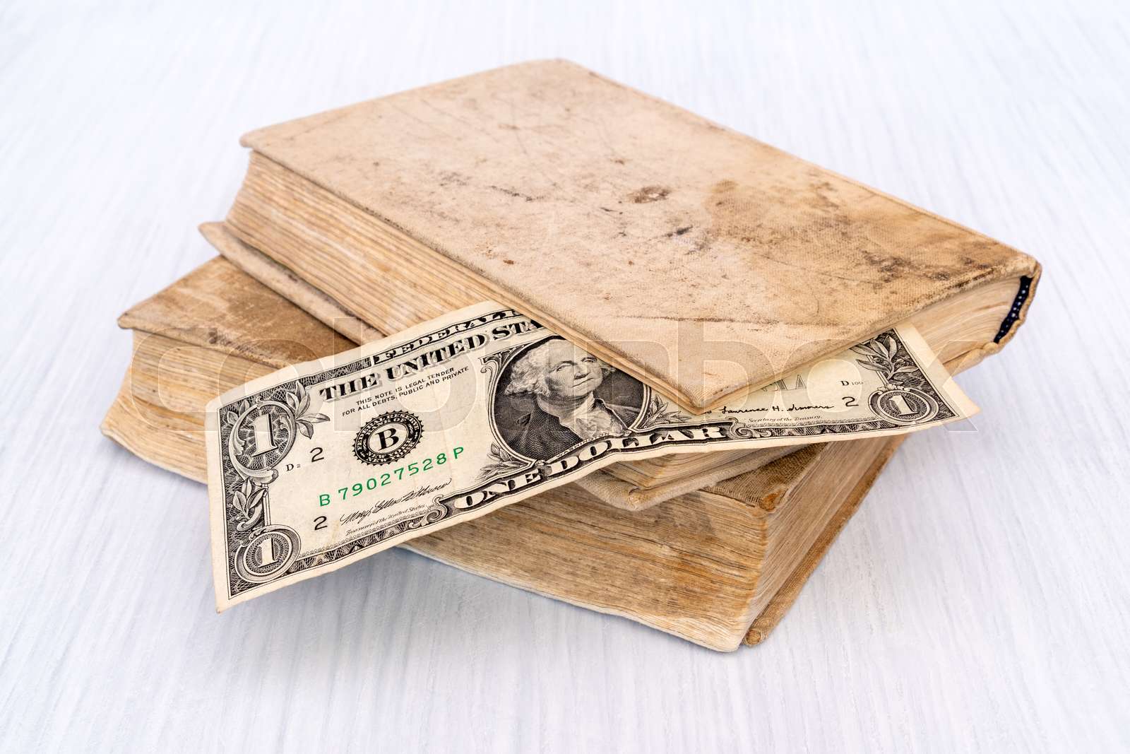 Old books with one dollar | Stock image | Colourbox