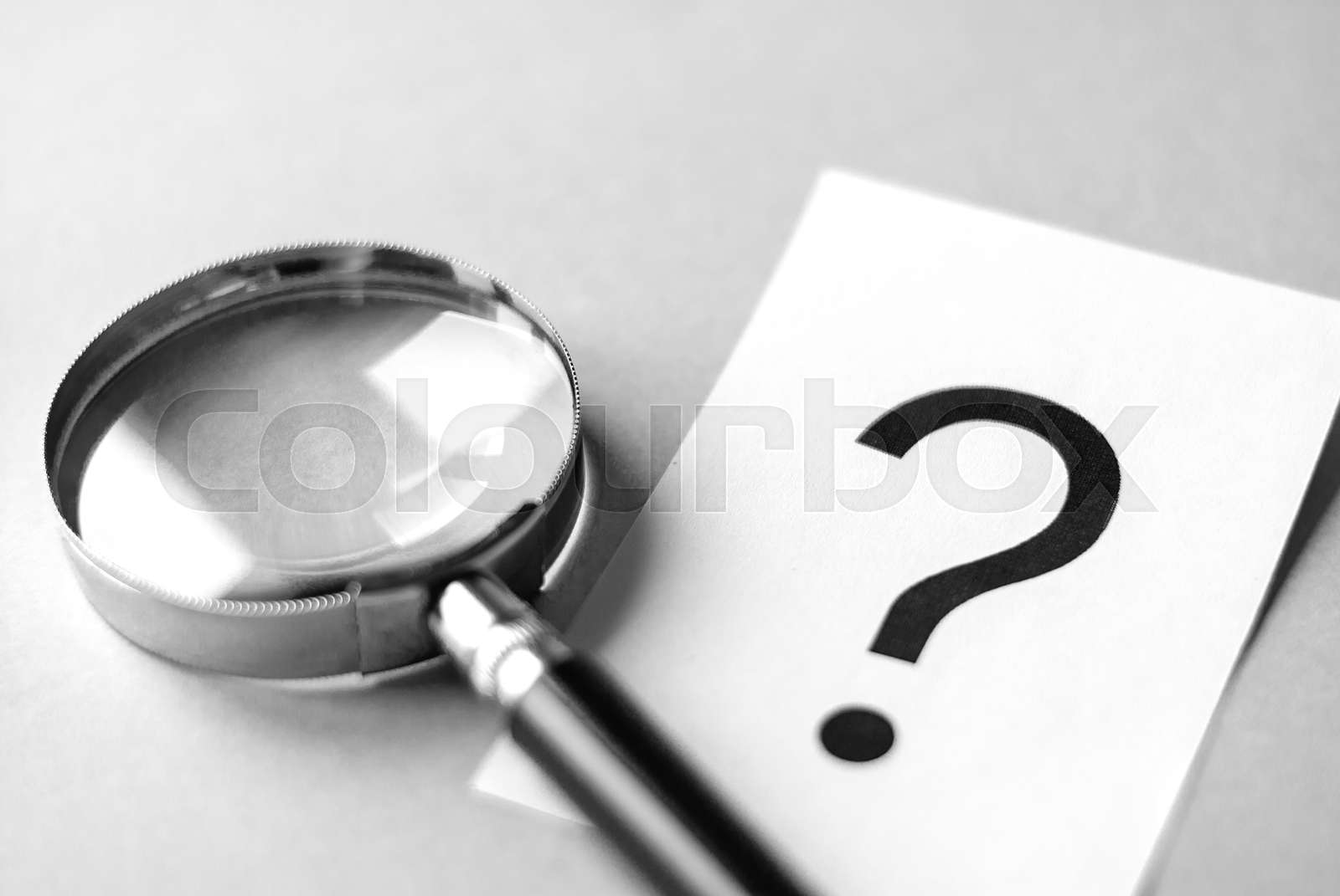 Question mark and magnifying glass | Stock image | Colourbox