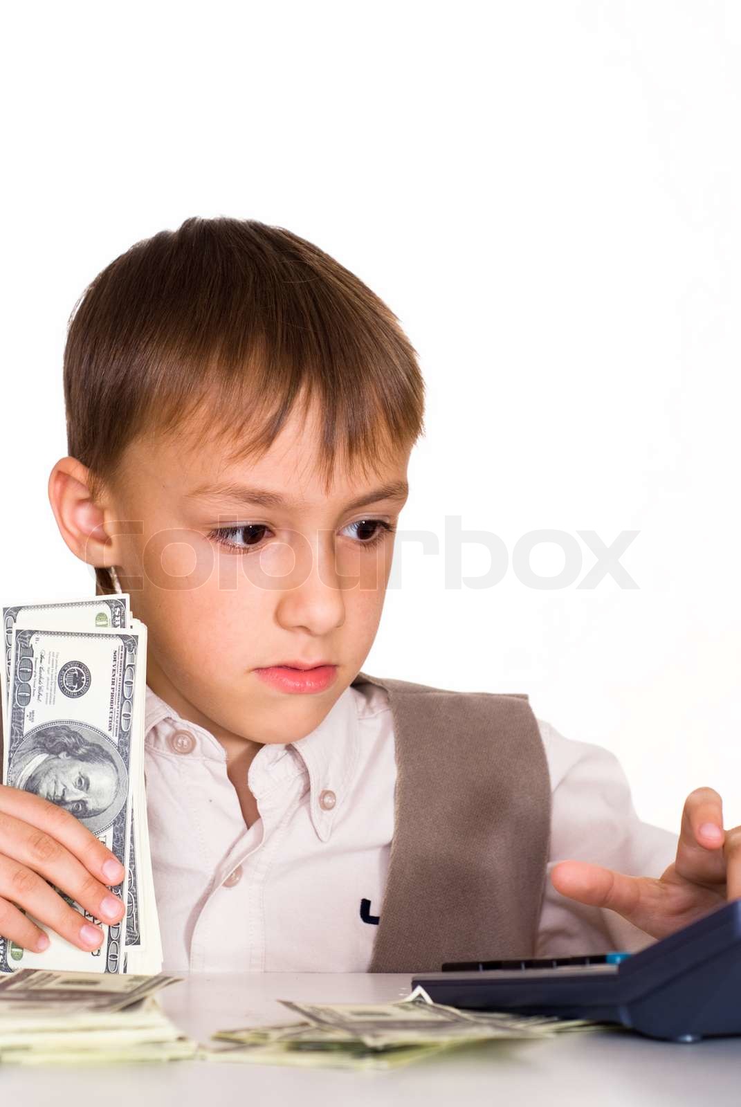 handsome boy finds money | Stock image | Colourbox