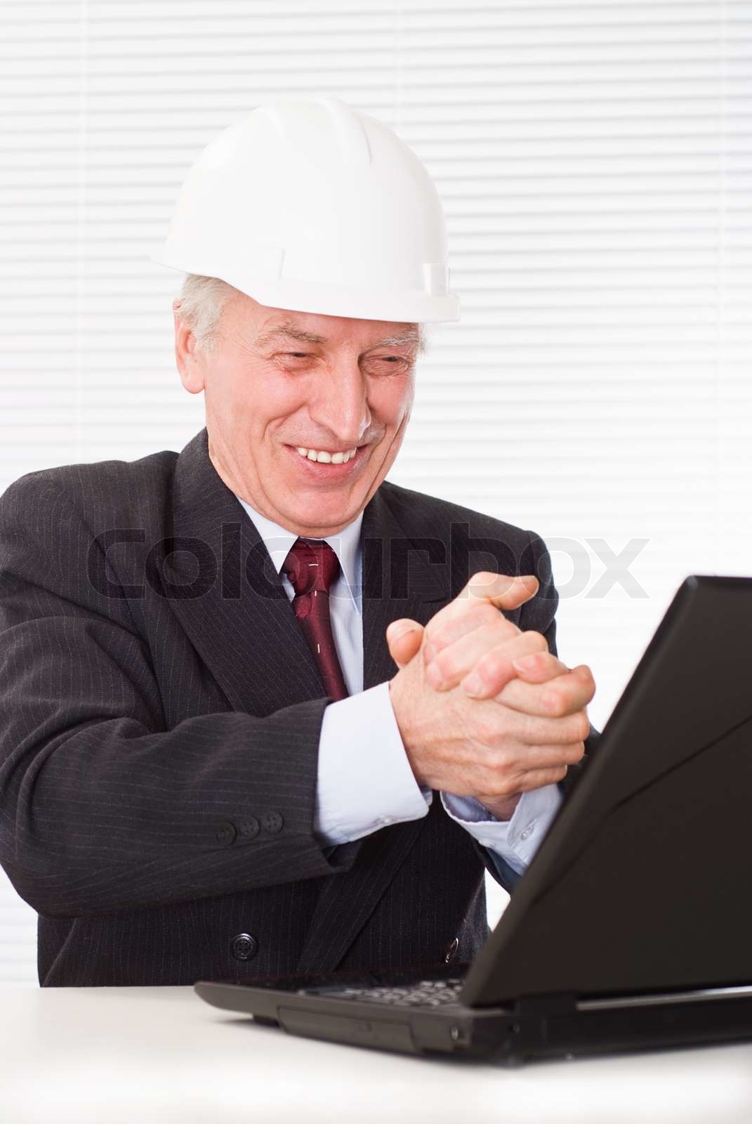 old builder in the helmet | Stock image | Colourbox