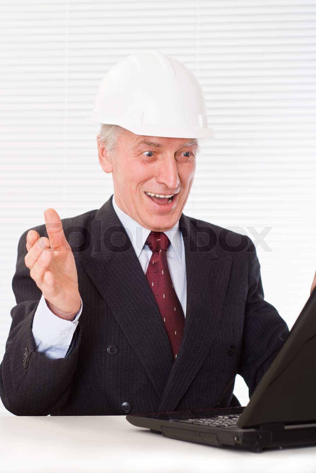 old builder in the helmet | Stock image | Colourbox