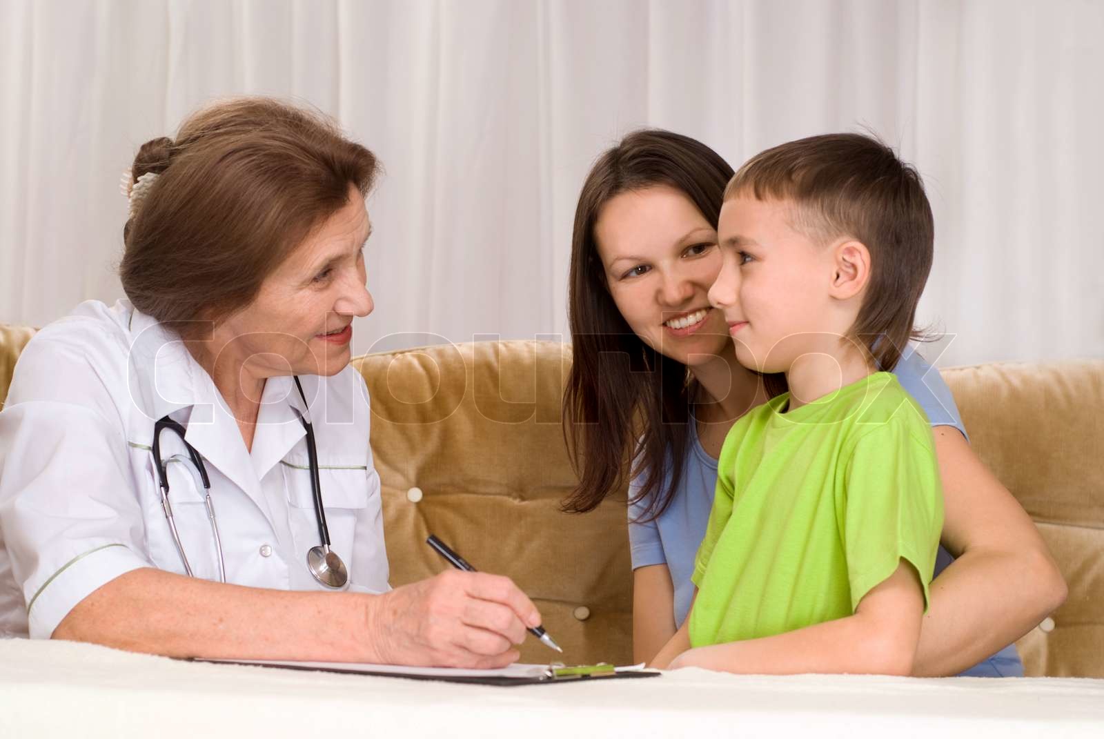 doctor and mom with a boy | Stock image | Colourbox