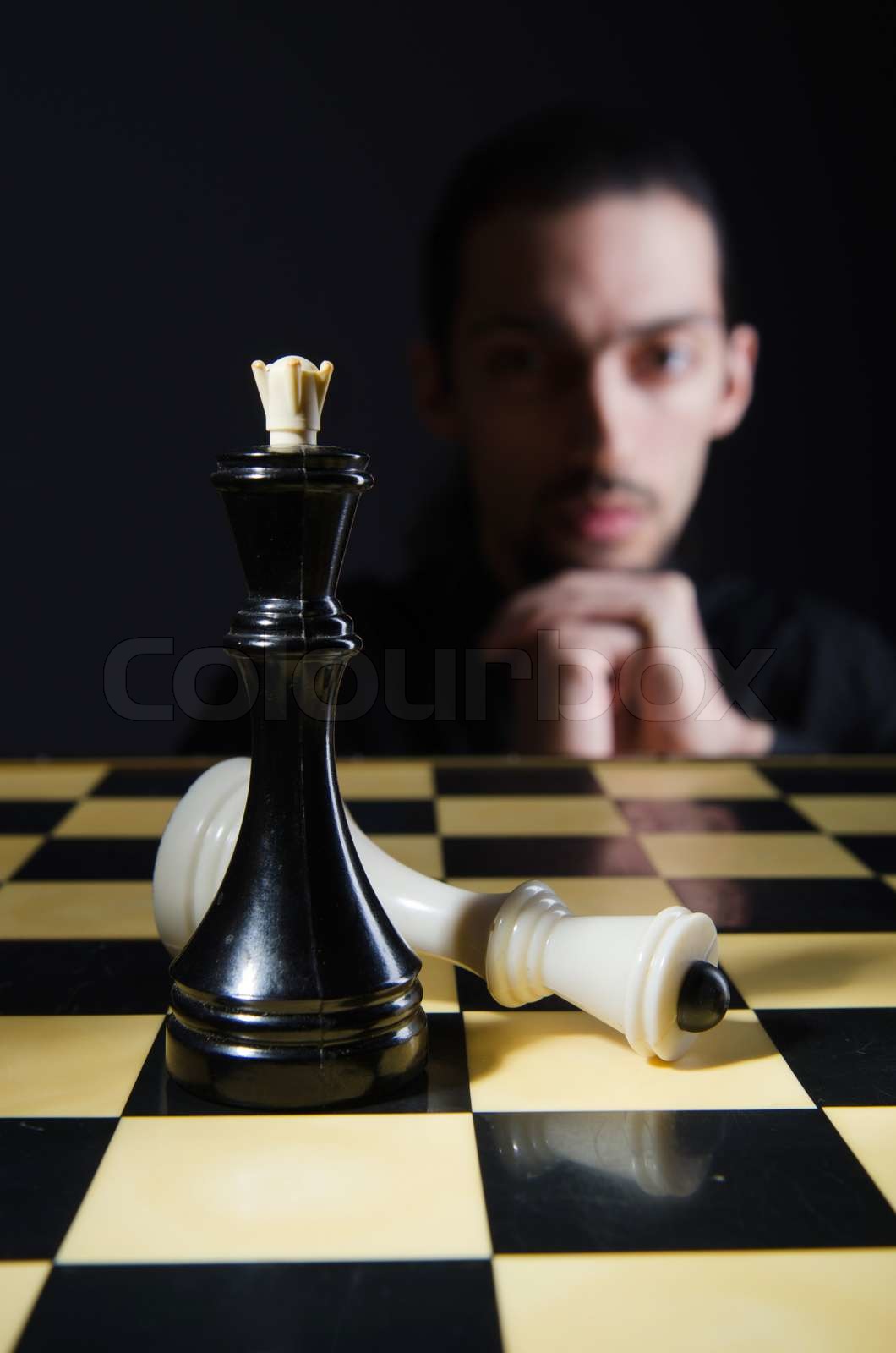 Chess player playing his game | Stock image | Colourbox