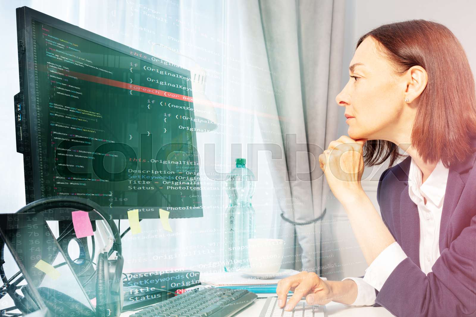Businesswoman using computer working in her office | Stock image ...