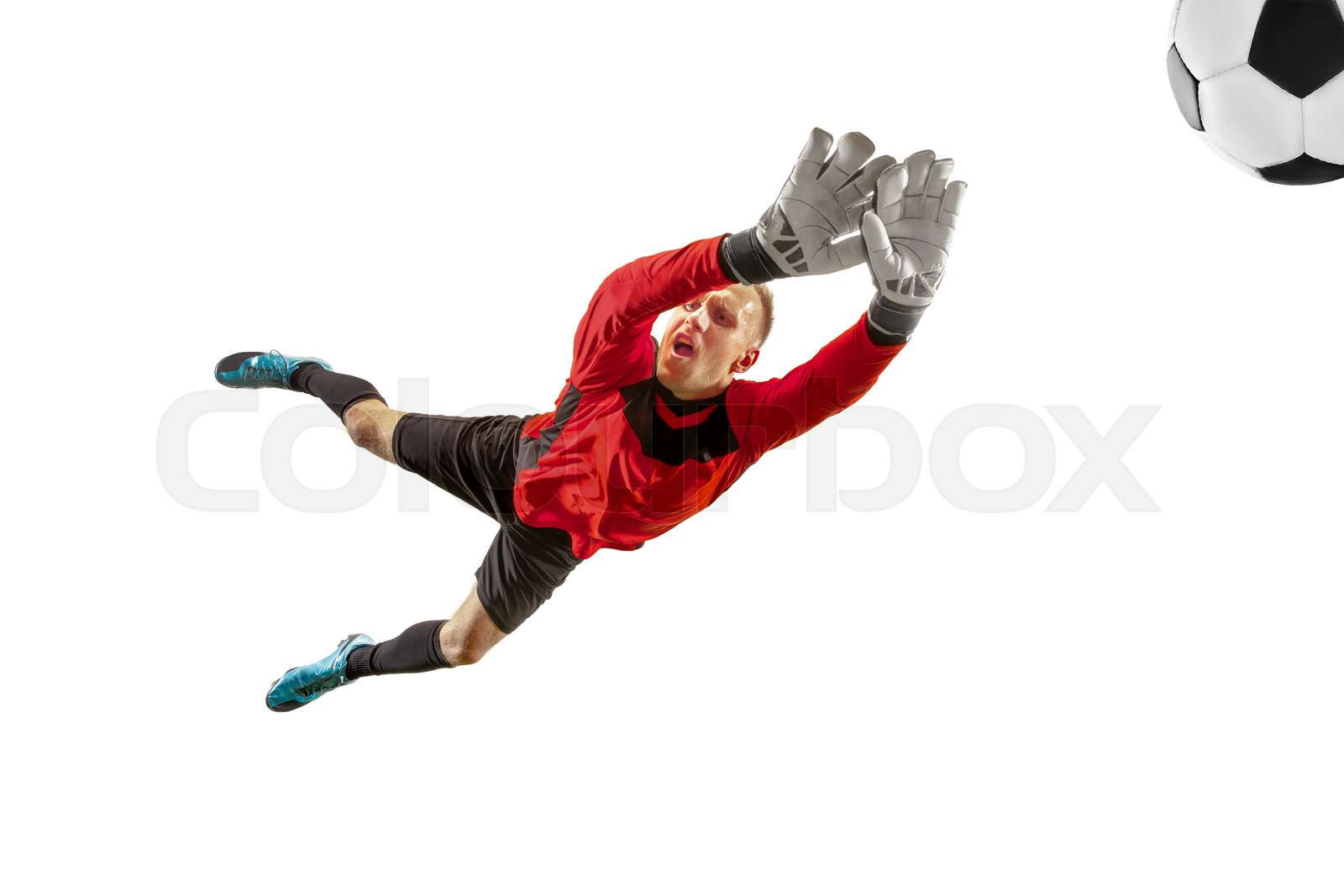 One soccer player goalkeeper man catching ball | Stock image | Colourbox