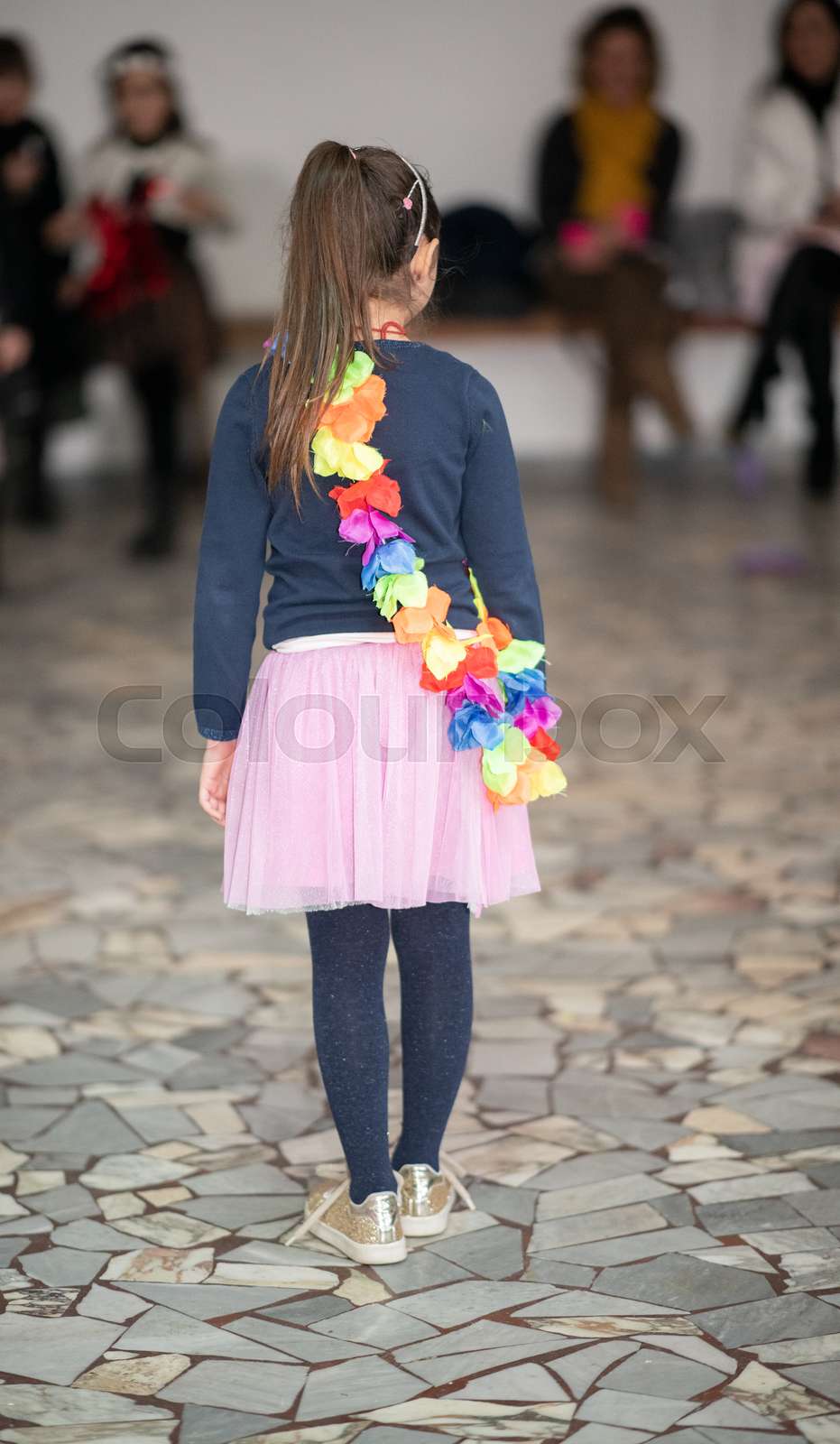 Back view of young girl dancing in front of publlic | Stock image ...