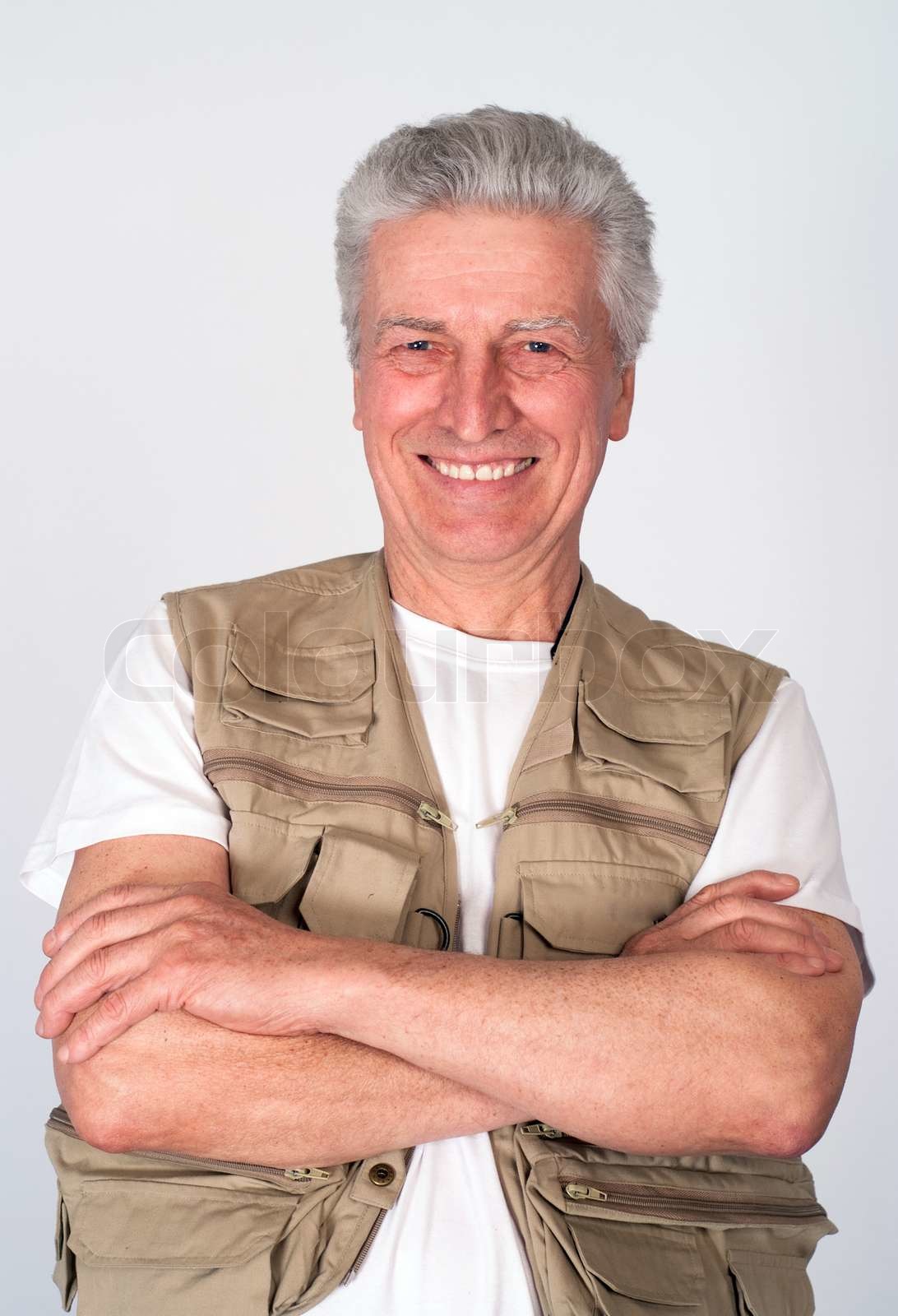 old builder smiling | Stock image | Colourbox