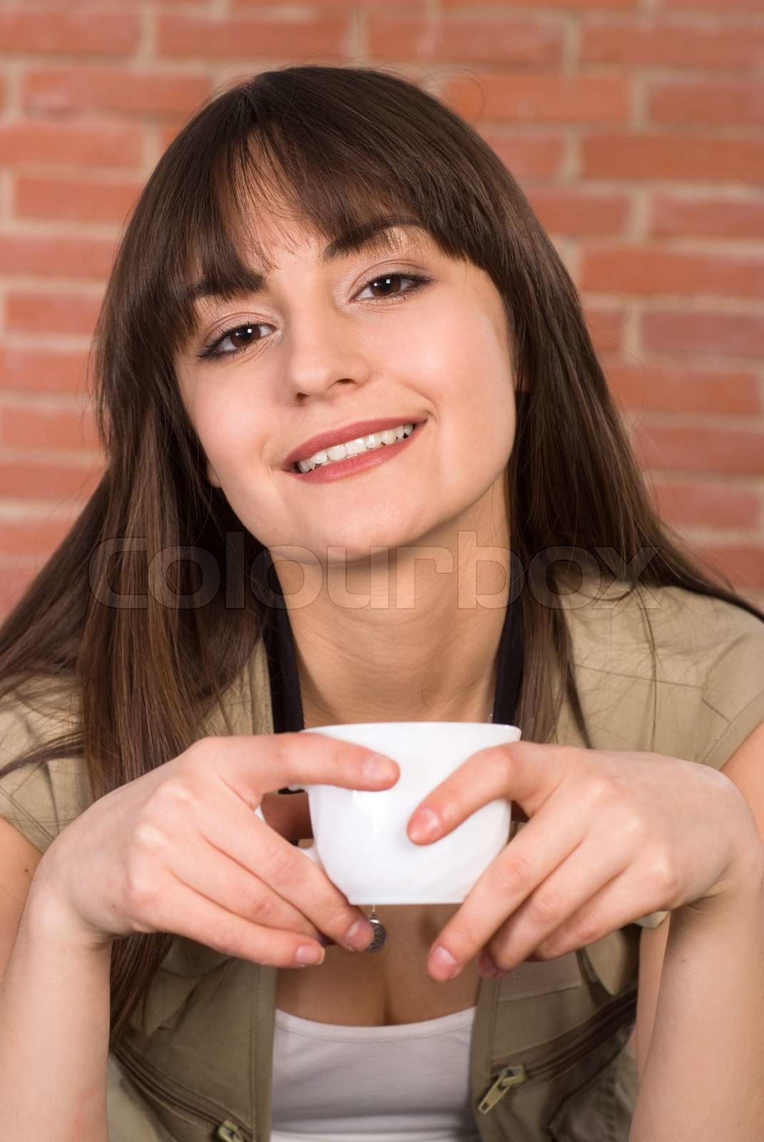 pretty girl with a cup | Stock image | Colourbox
