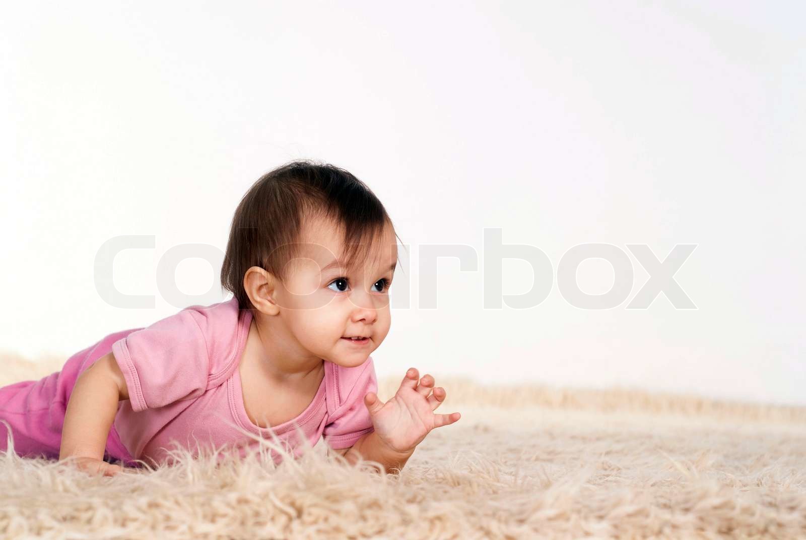 baby on the carpet | Stock image | Colourbox