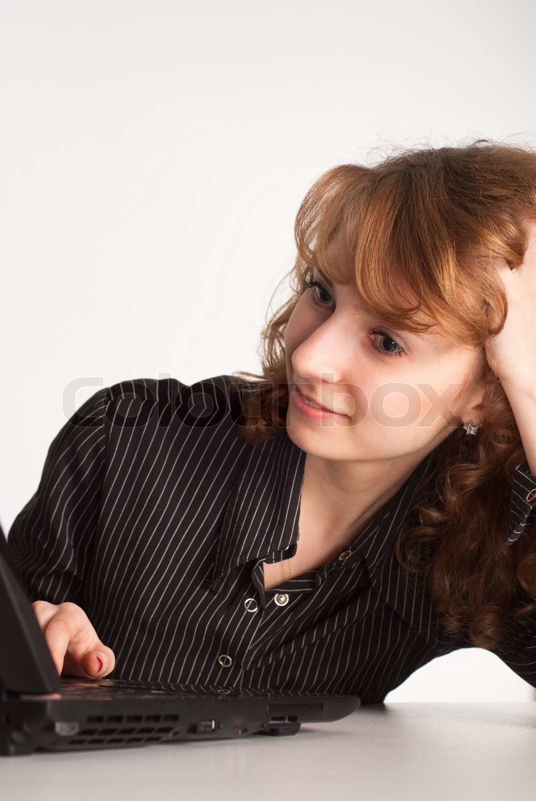 cute girl with laptop | Stock image | Colourbox
