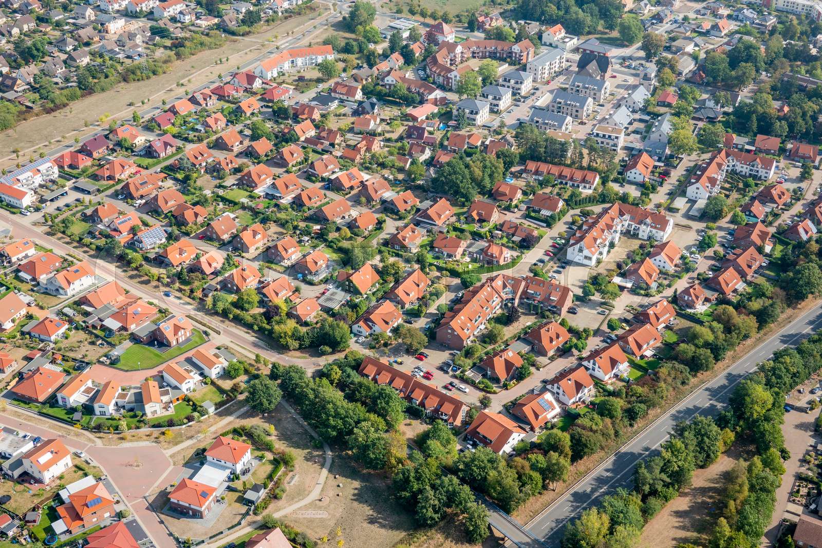Aerial view of a German suburb with streets and many small houses for ...
