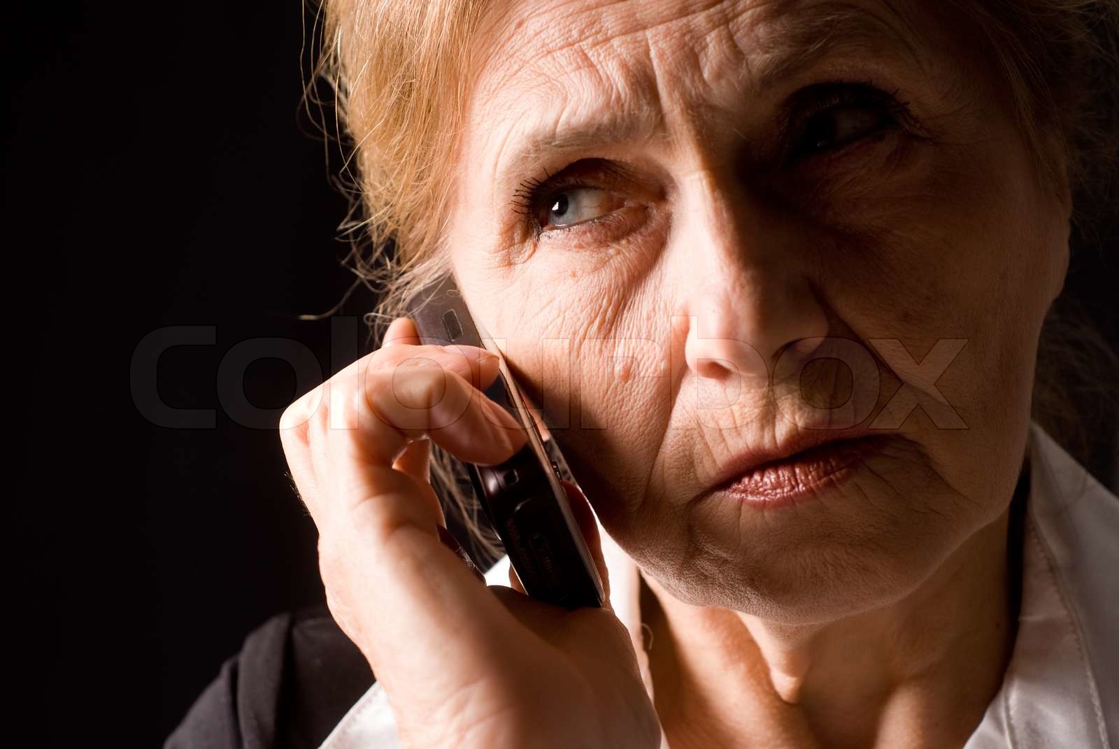 old woman with phone | Stock image | Colourbox