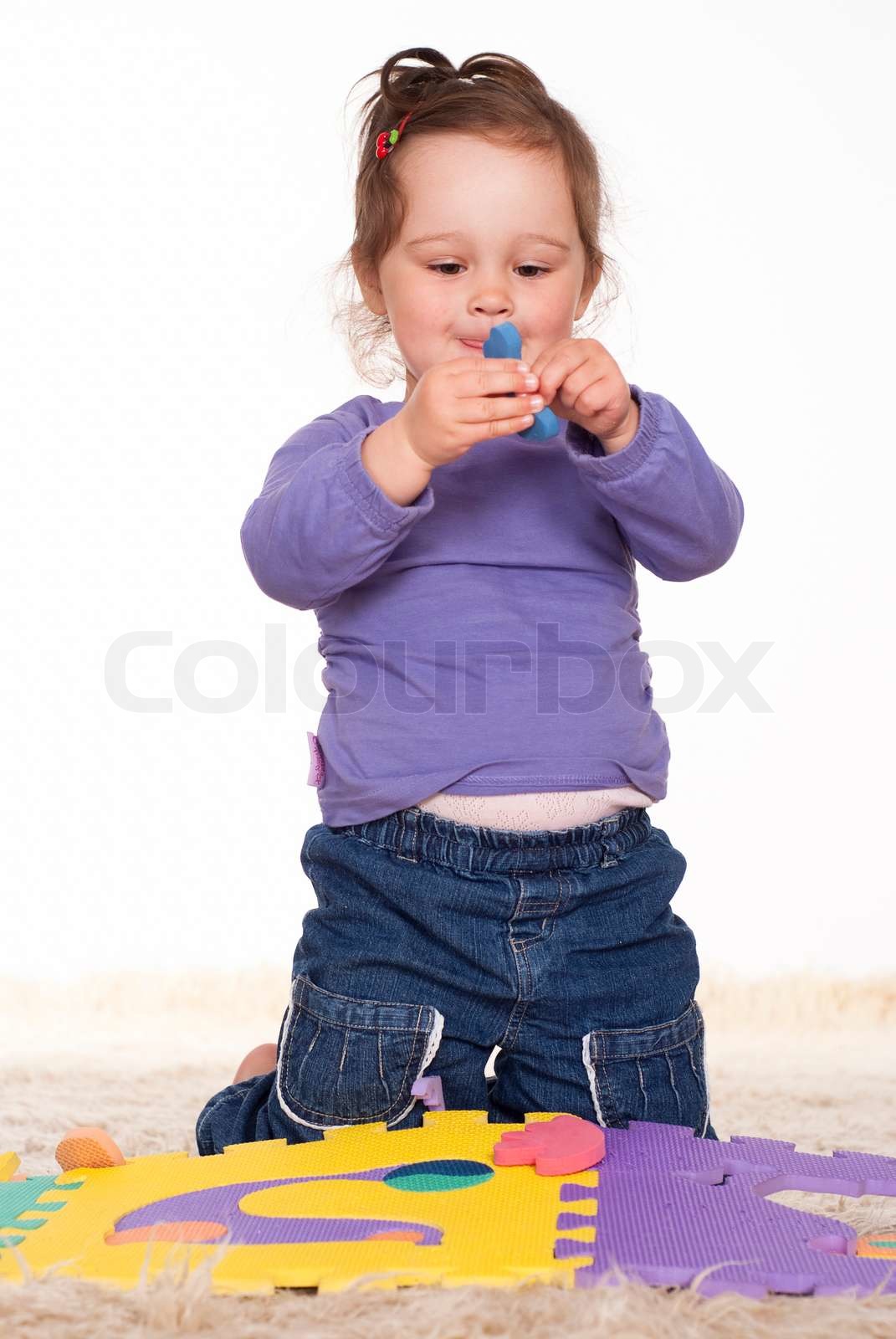 funny girl playing | Stock image | Colourbox
