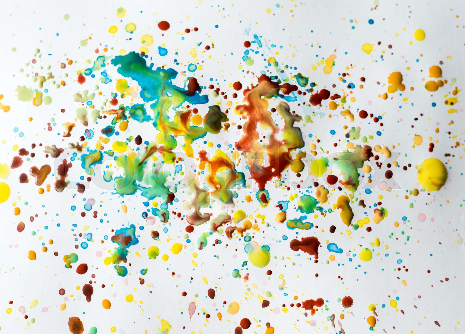 Droplets of paint mixed into painting | Stock image | Colourbox