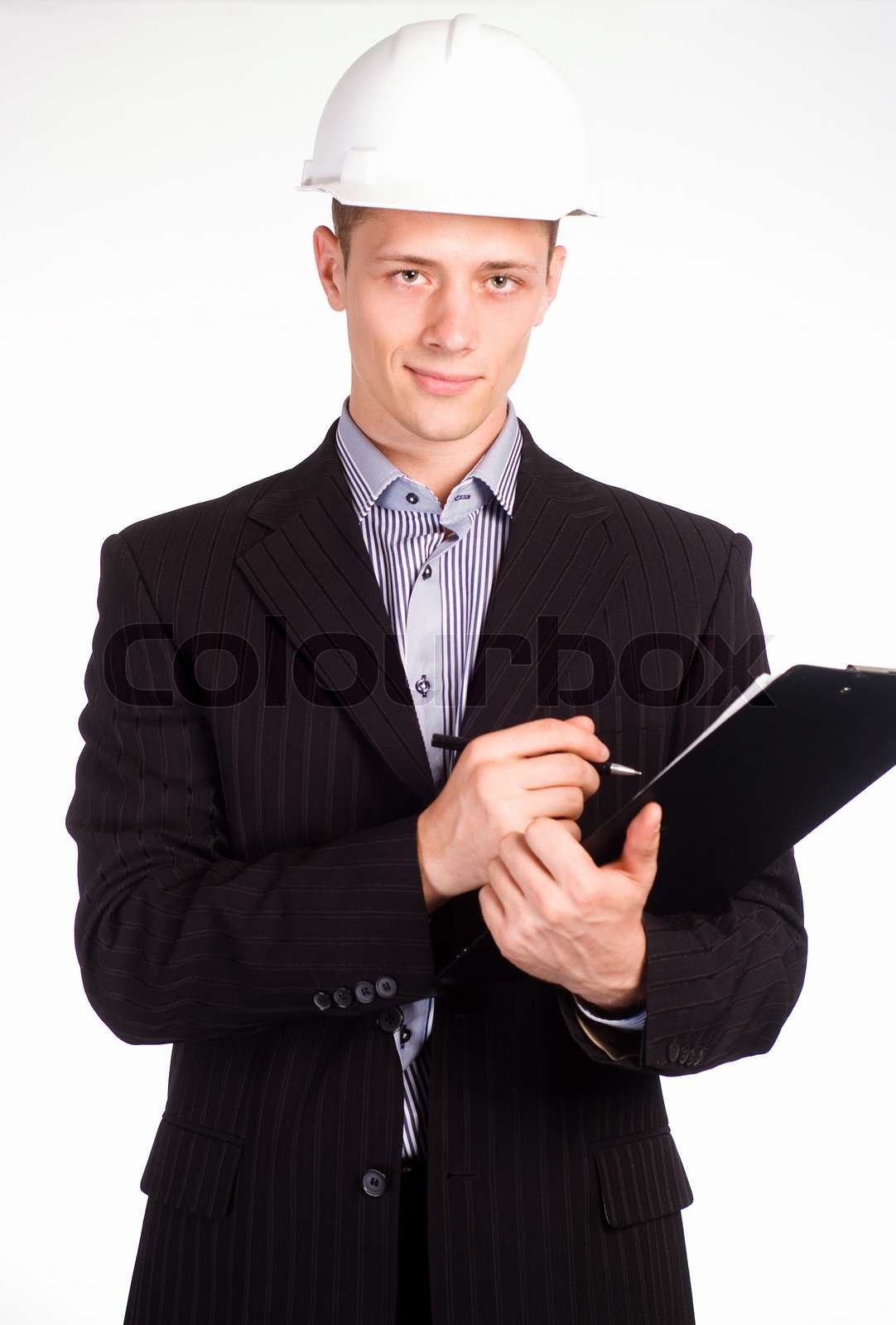 erfolgreiche Arbeiter in Helm | Stock Bild | Colourbox