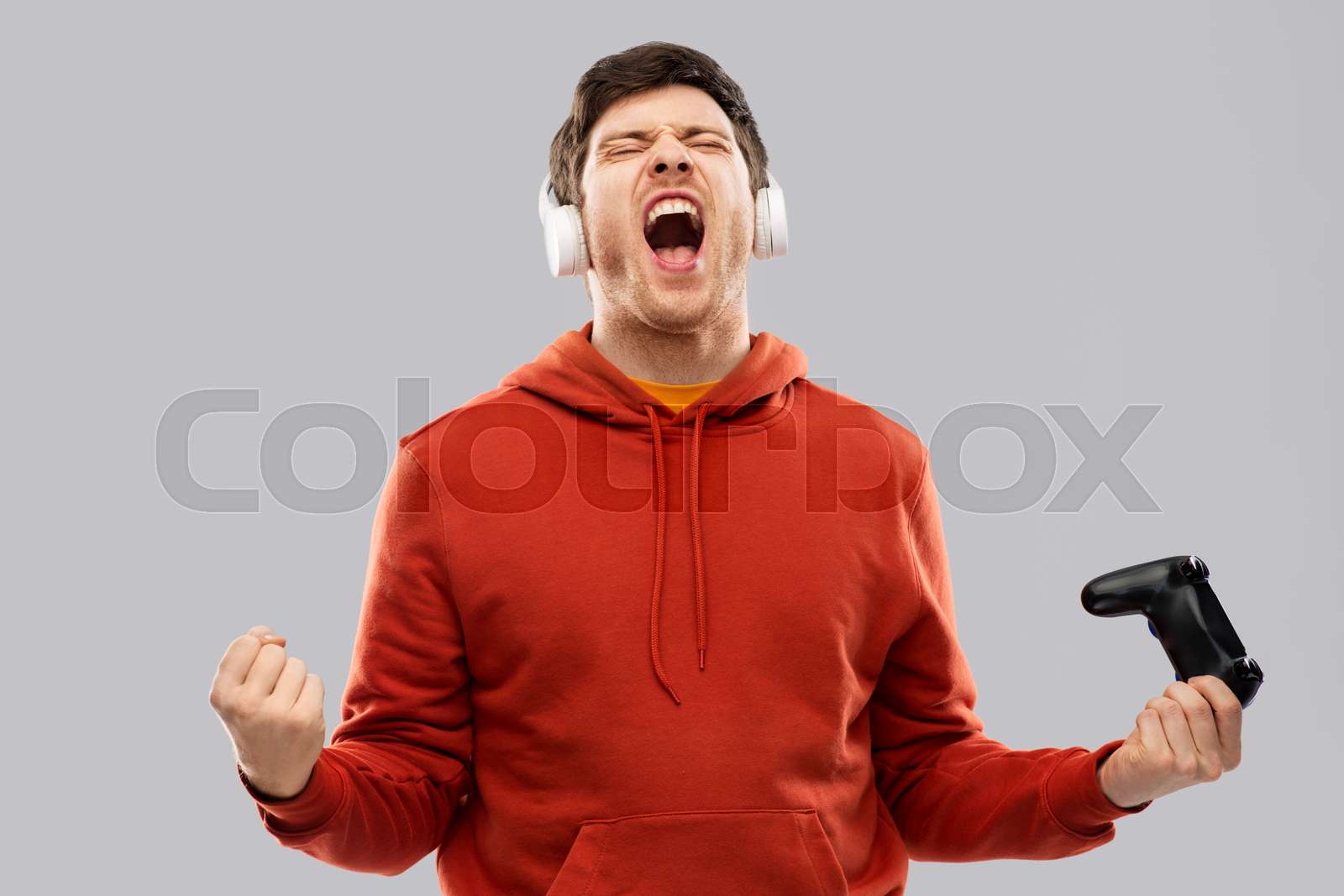 man or or gamer with gamepad winning in video game | Stock image ...