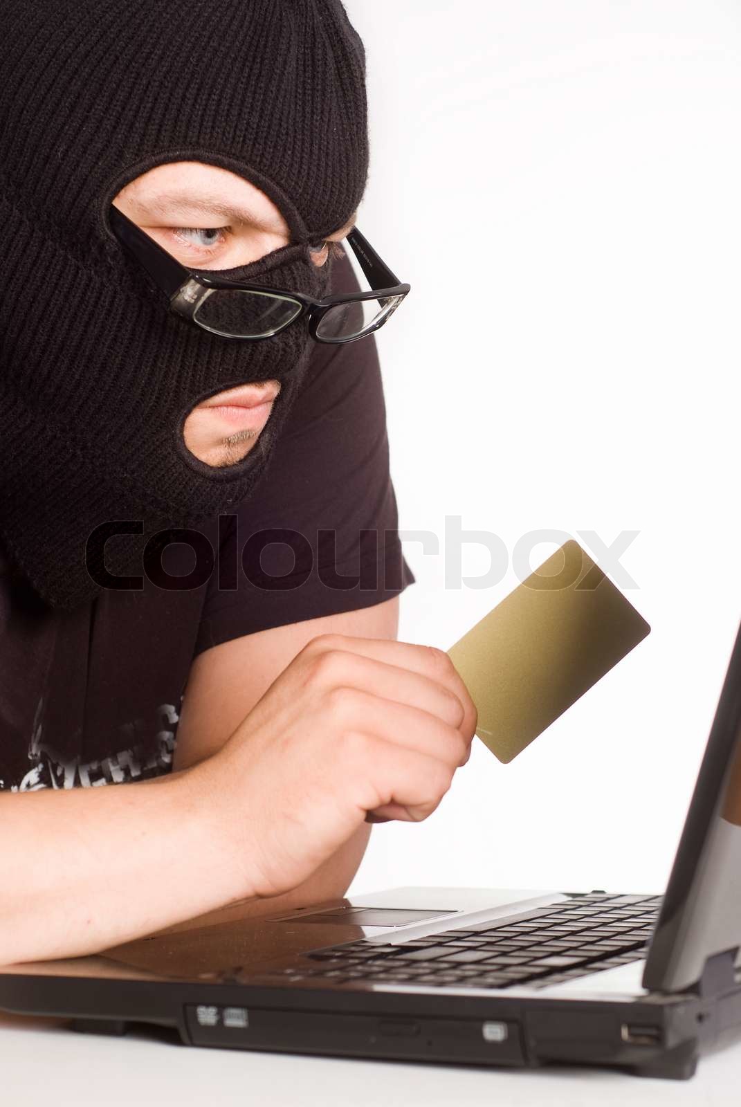 robber with laptop | Stock image | Colourbox