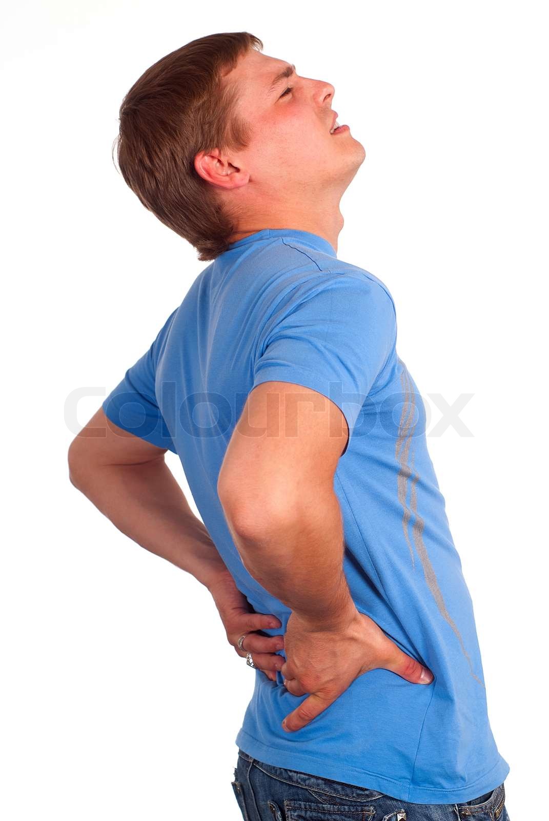 man shows pain | Stock image | Colourbox