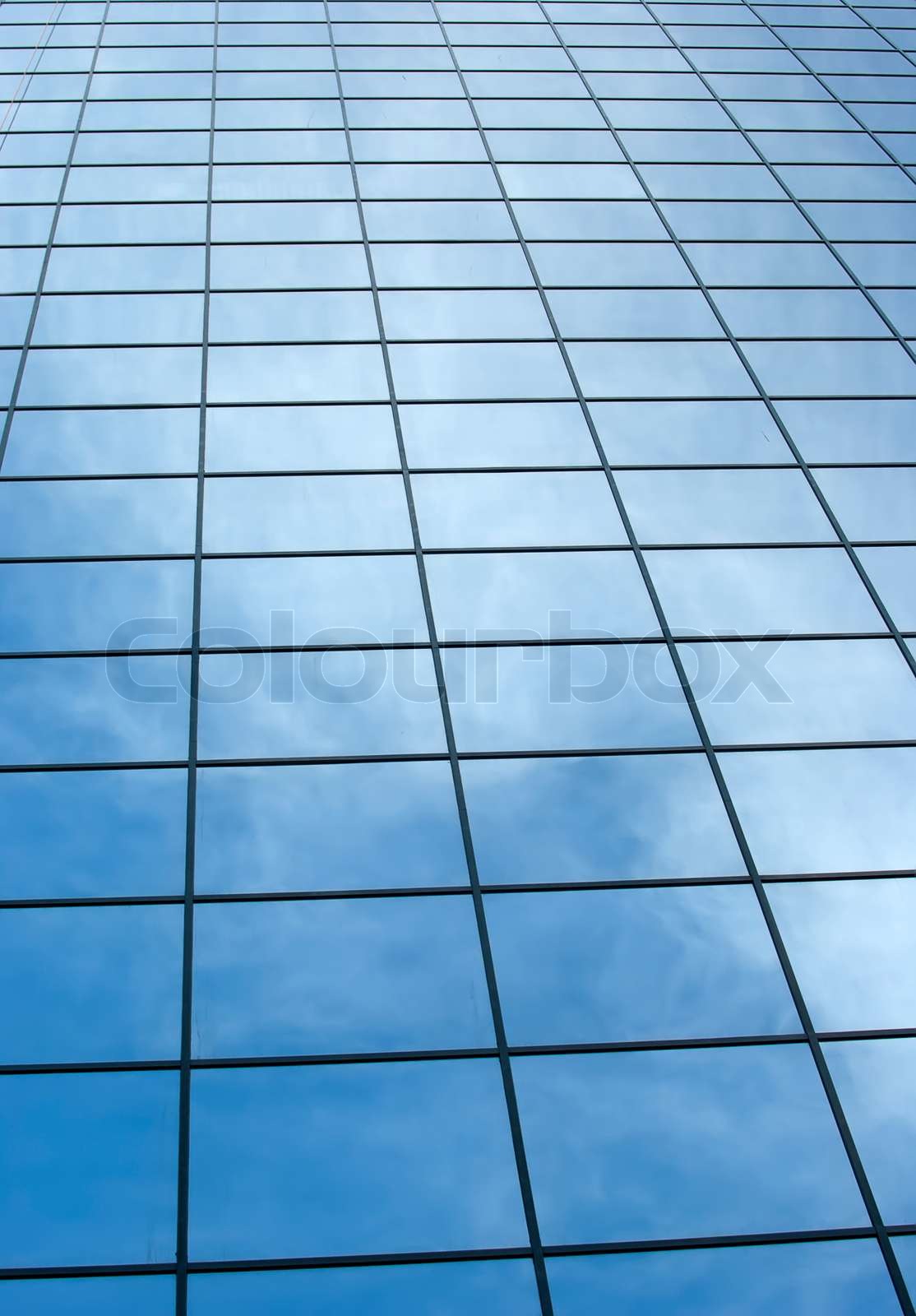 Modern office building with blue square windows | Stock image | Colourbox