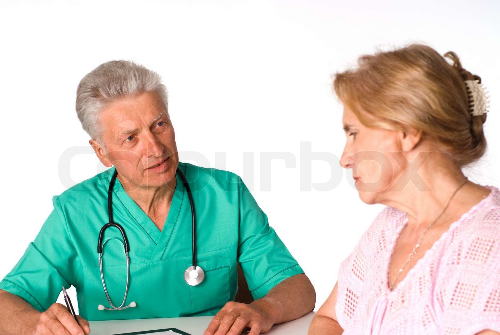 doctor and sad patient | Stock image | Colourbox