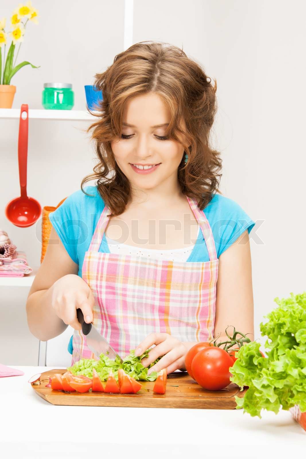 beautiful woman in the kitchen | Stock image | Colourbox