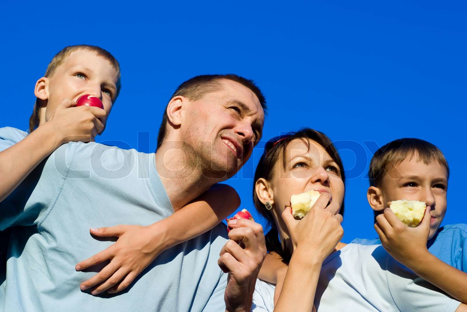 family eating portrait | Stock image | Colourbox