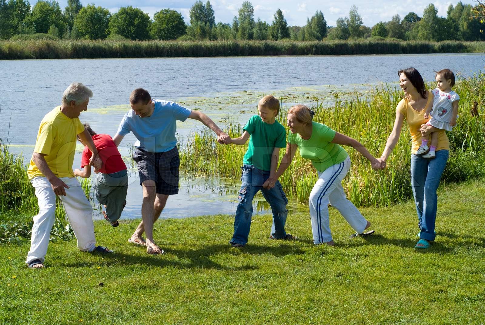family playing outside | Stock image | Colourbox
