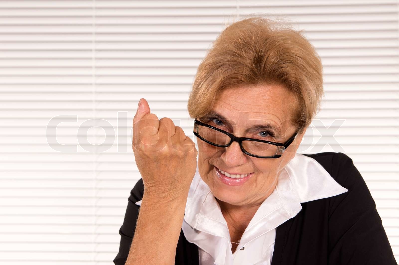 smart old woman at office | Stock image | Colourbox