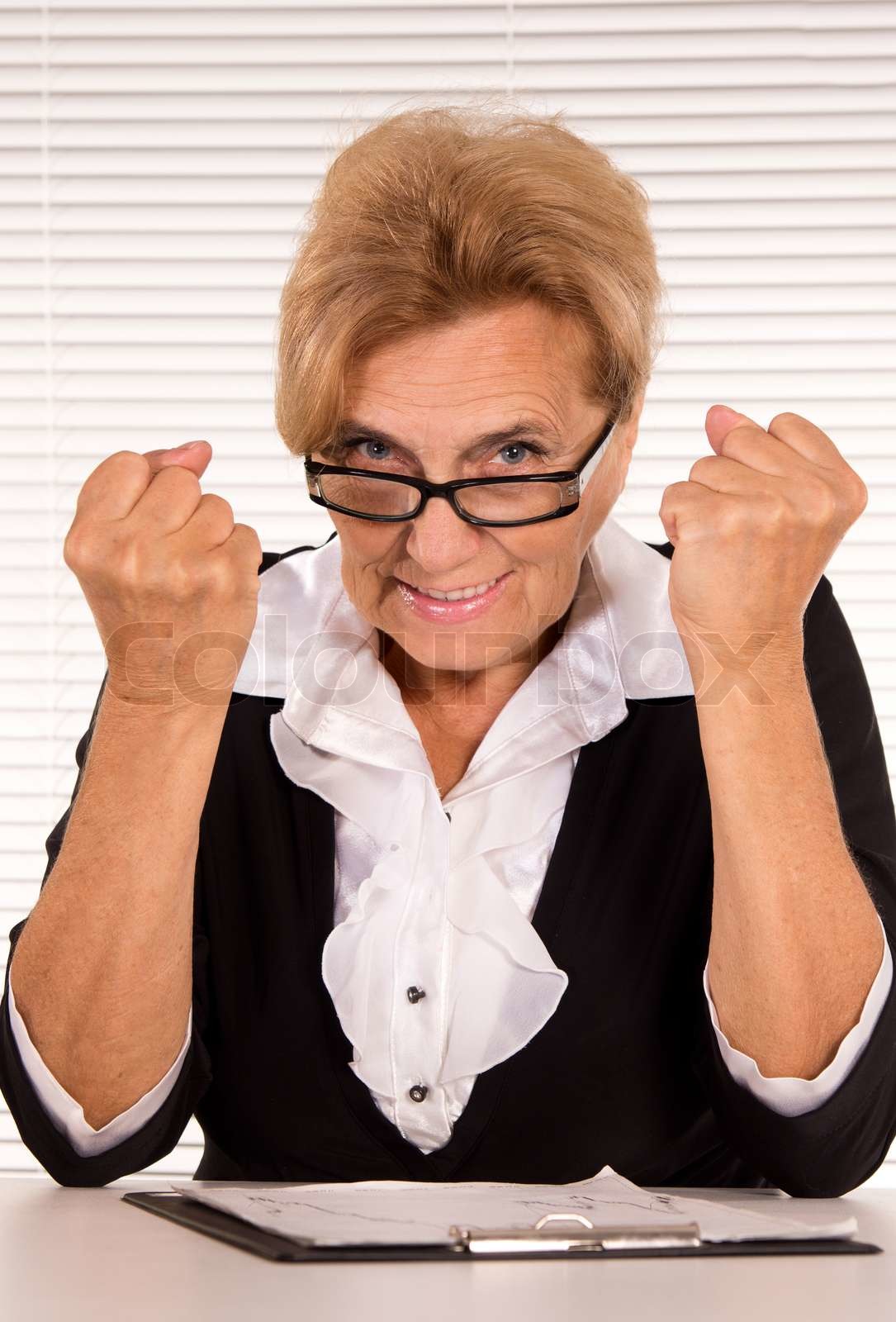 smart old woman at office | Stock image | Colourbox