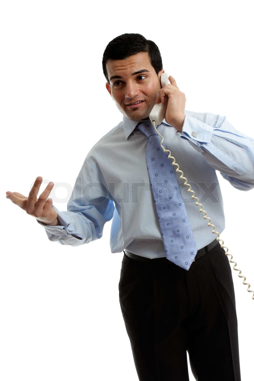 Businessman salesman talking on the phone | Stock image | Colourbox