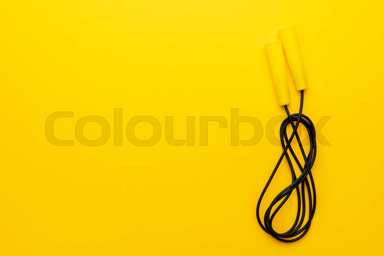 yellow skipping rope | Stock image | Colourbox