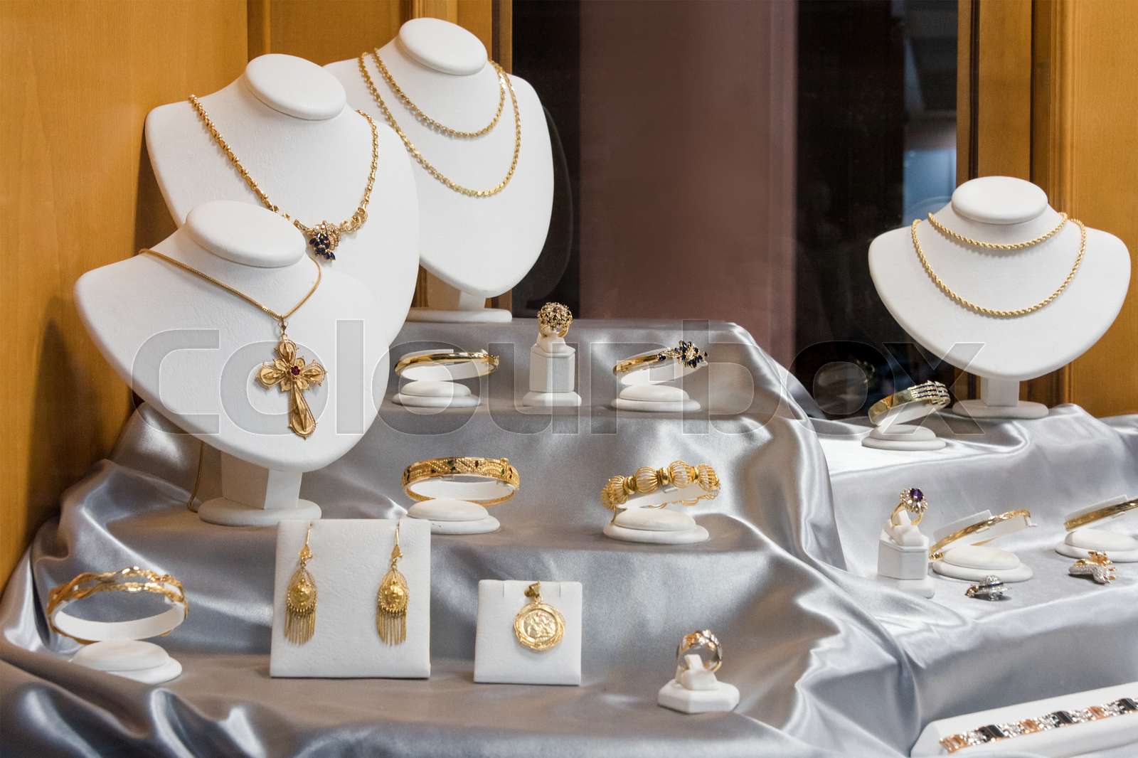 Jewelry diamond rings and necklaces show in luxury retail store window ...