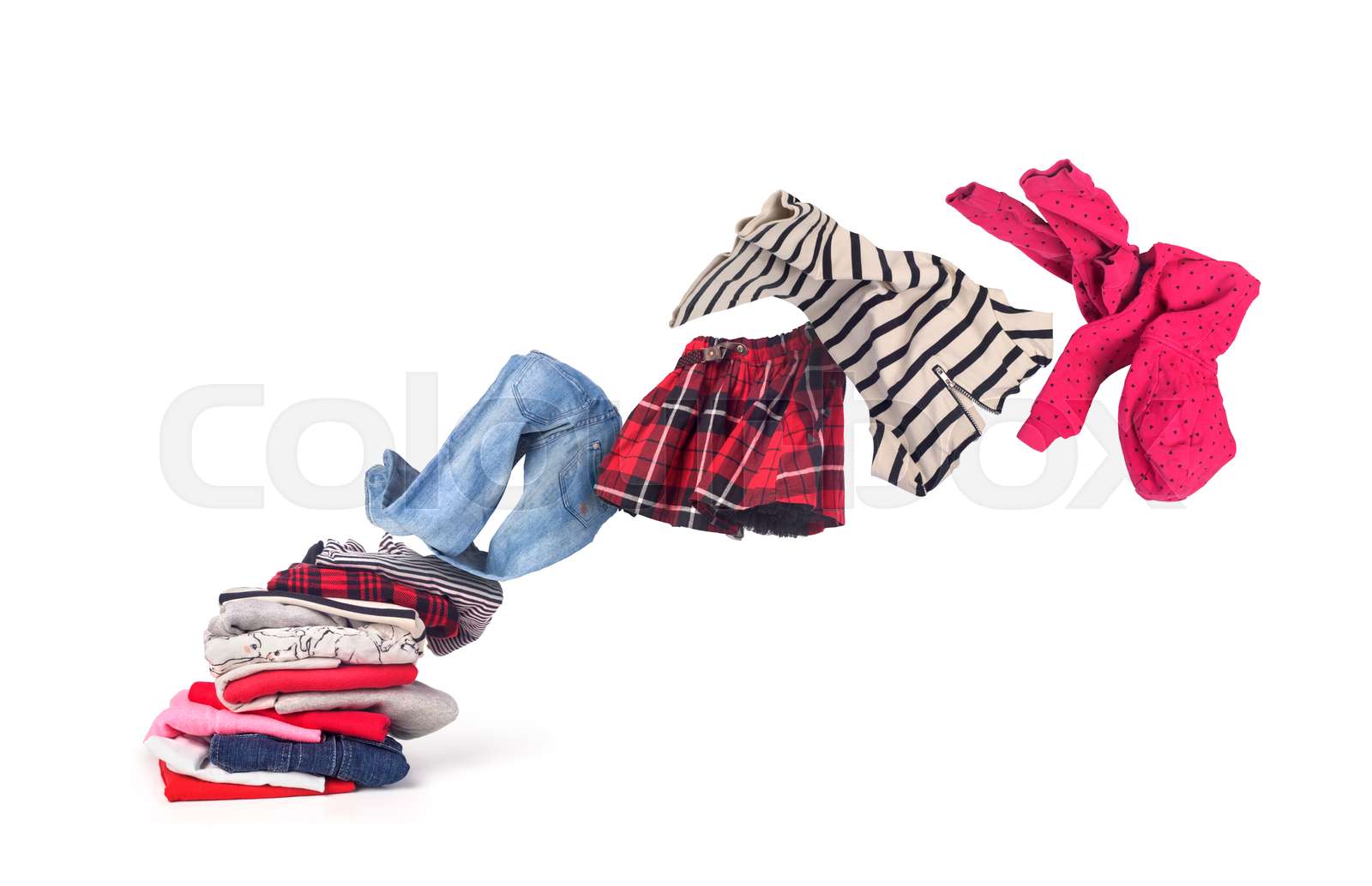 stack of clothing isolated on white | Stock image | Colourbox