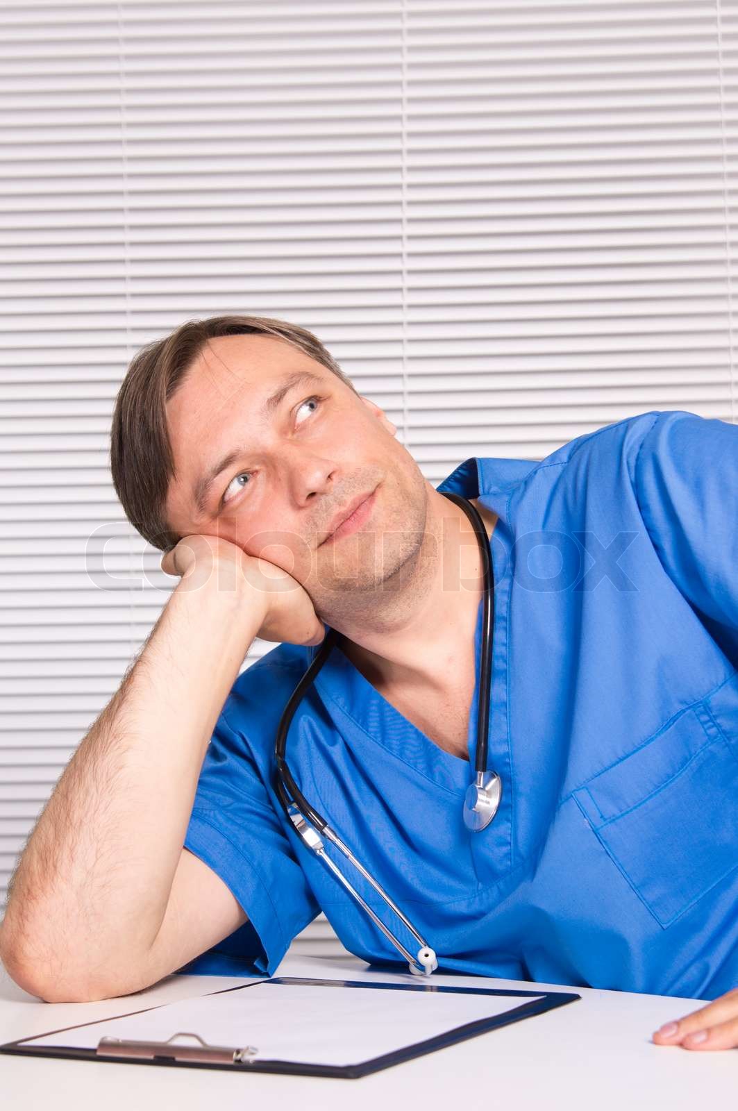 nice doctor sitting | Stock image | Colourbox