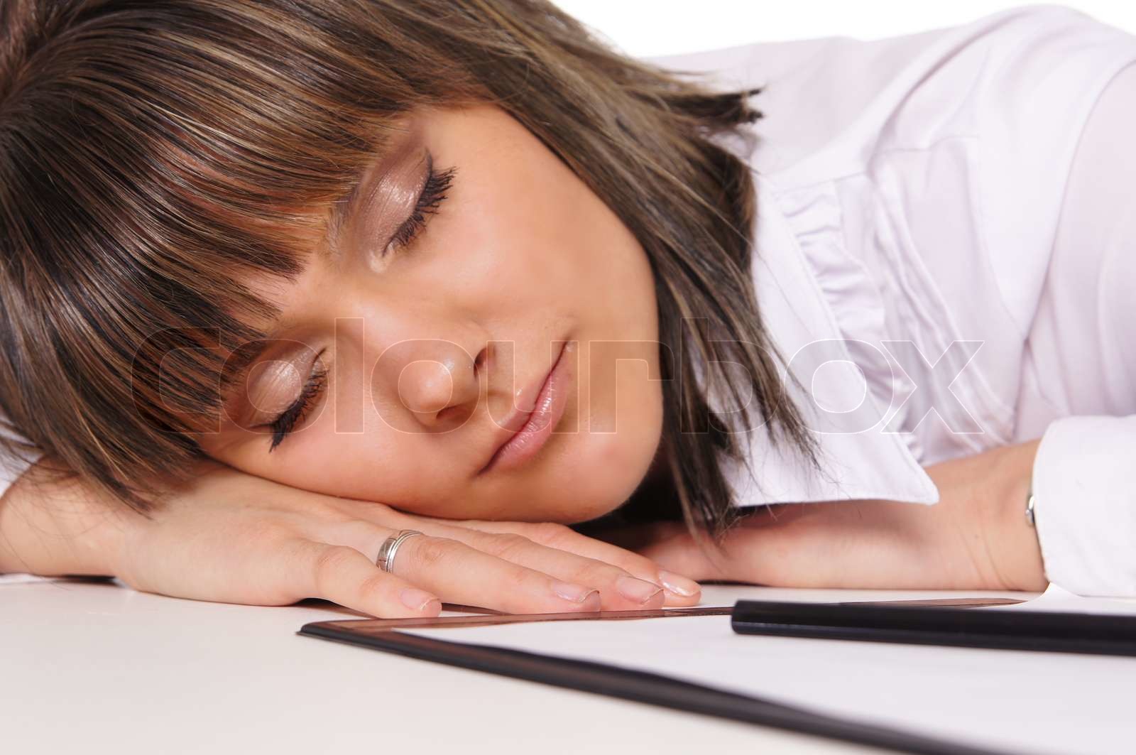 woman lying at table | Stock image | Colourbox