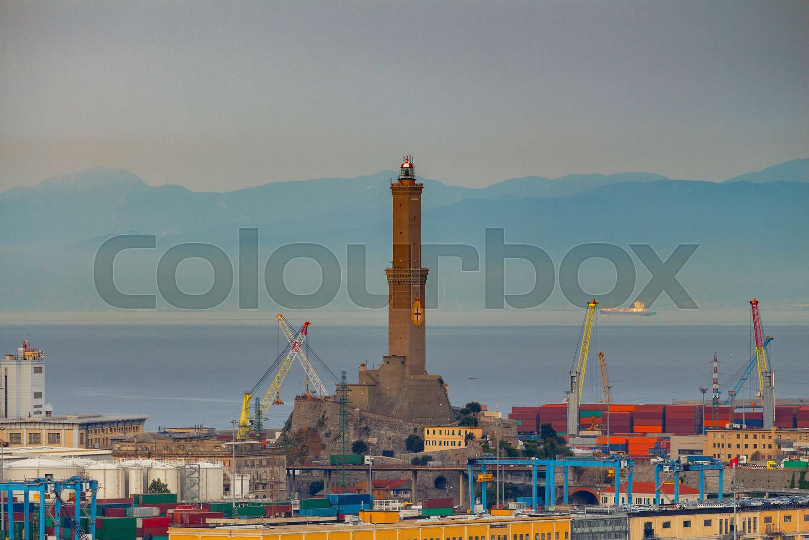 Genoa. Old lighthouse in port. | Stock image | Colourbox